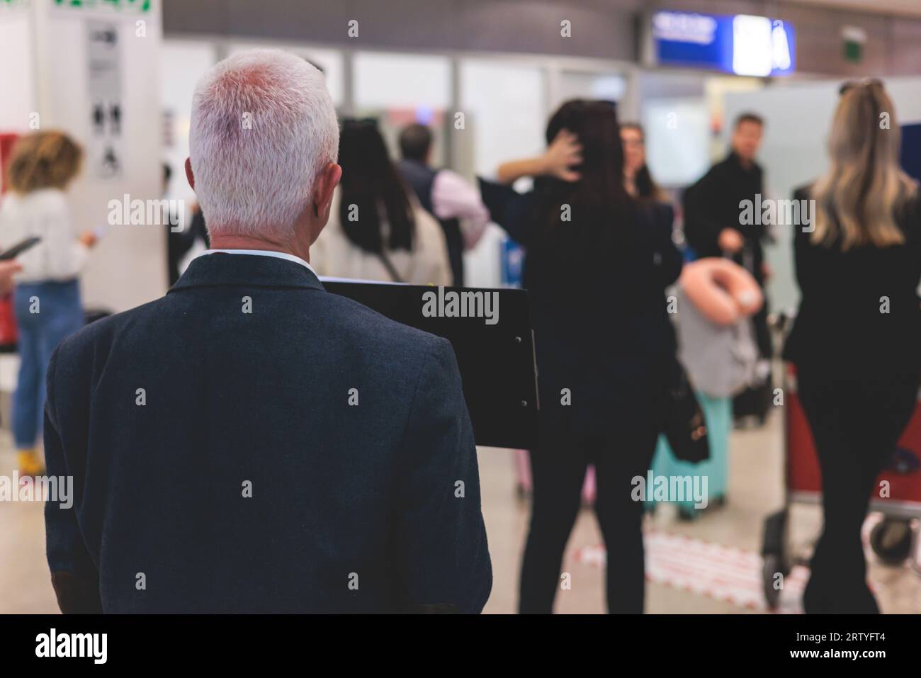 Meeting at the airport, person holding a placard card sign with welcome ...
