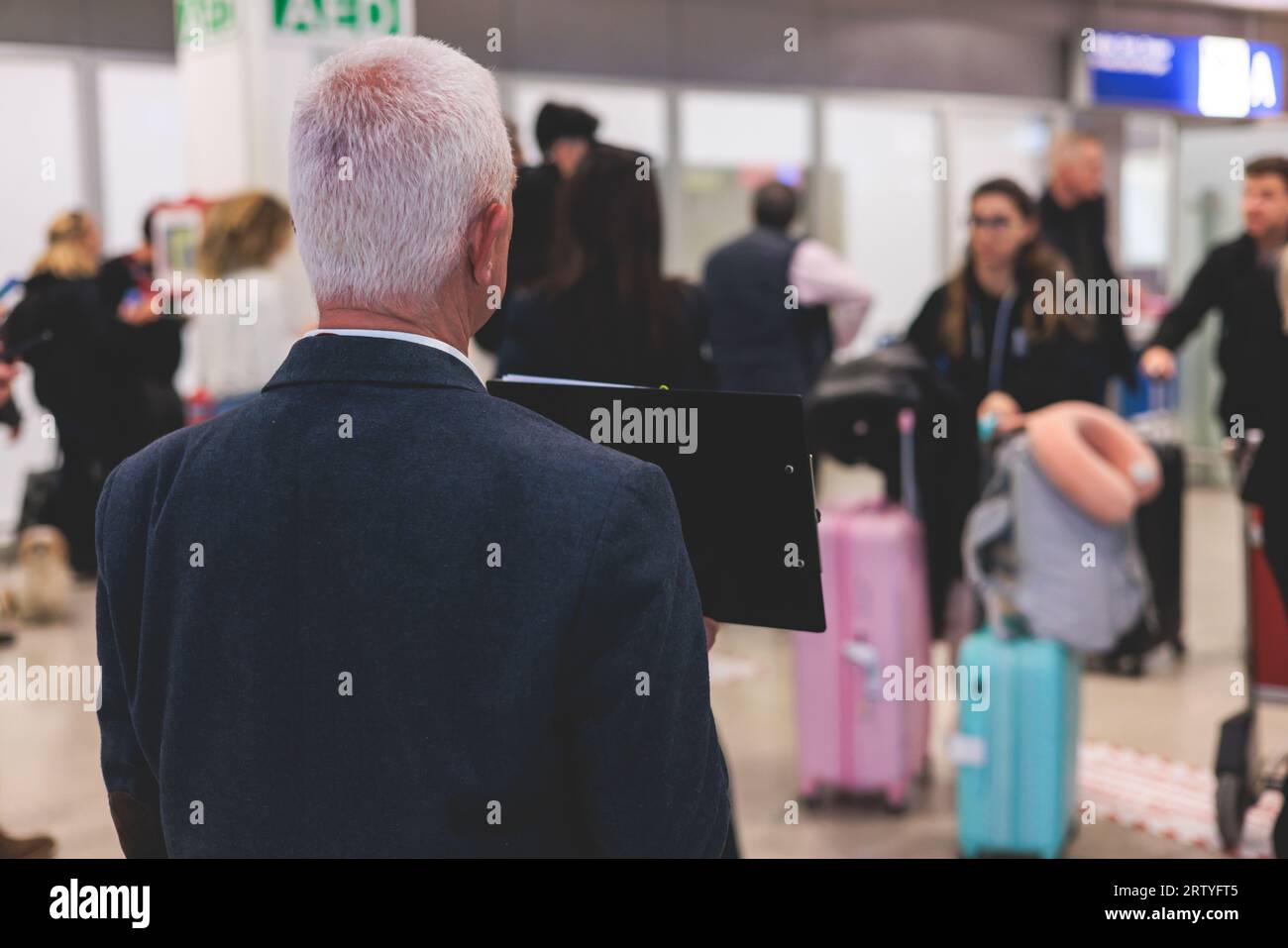 Meeting at the airport, person holding a placard card sign with welcome ...