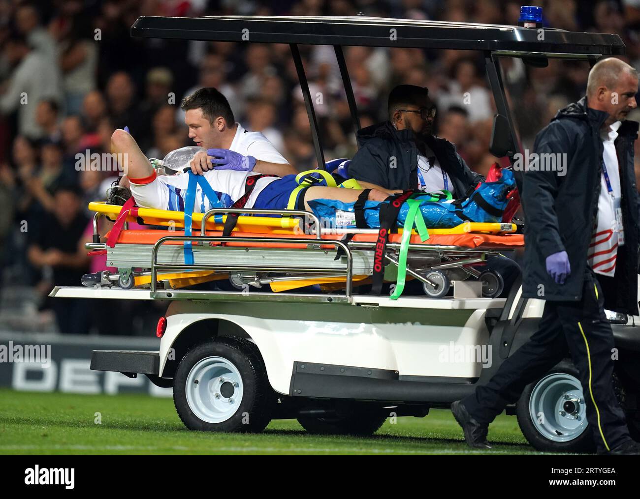 Namibia's Le Roux Malan taken off the pitch on a stretcher after ...