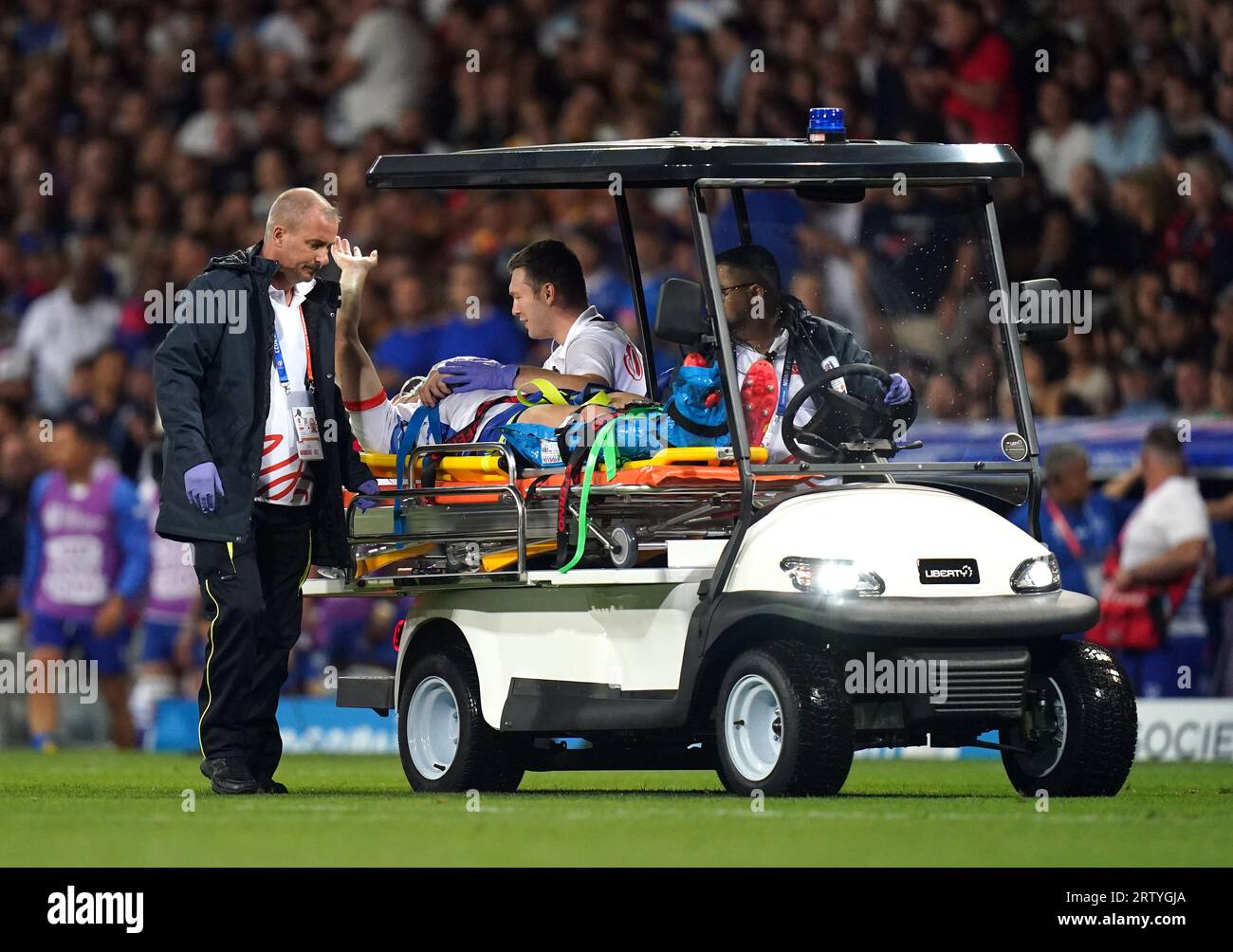 Namibia's Le Roux Malan taken off the pitch on a stretcher after ...