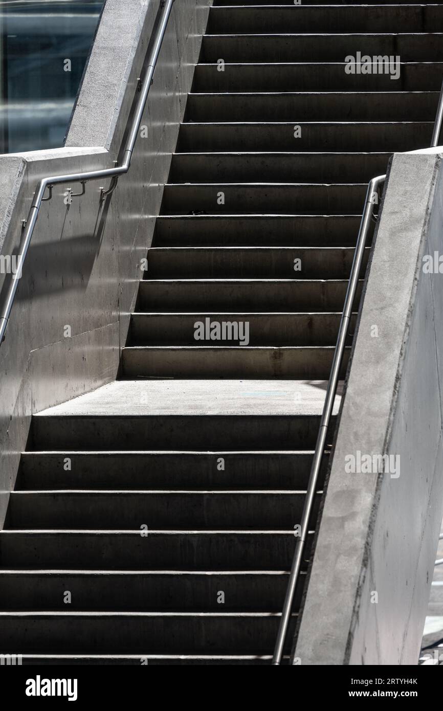 Tall concrete stairs in sunshine Stock Photo - Alamy