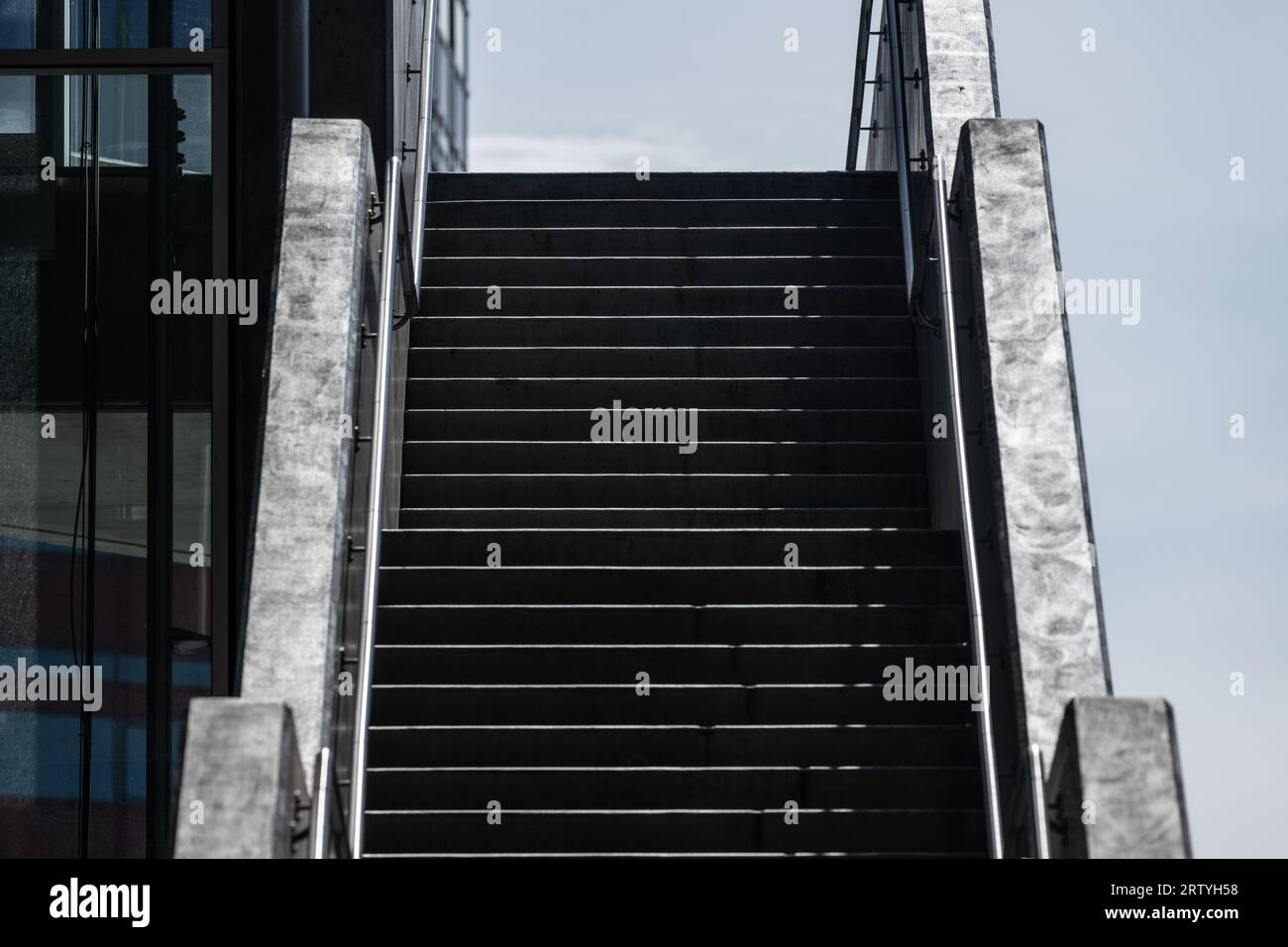 Tall concrete stairs in sunshine Stock Photo - Alamy