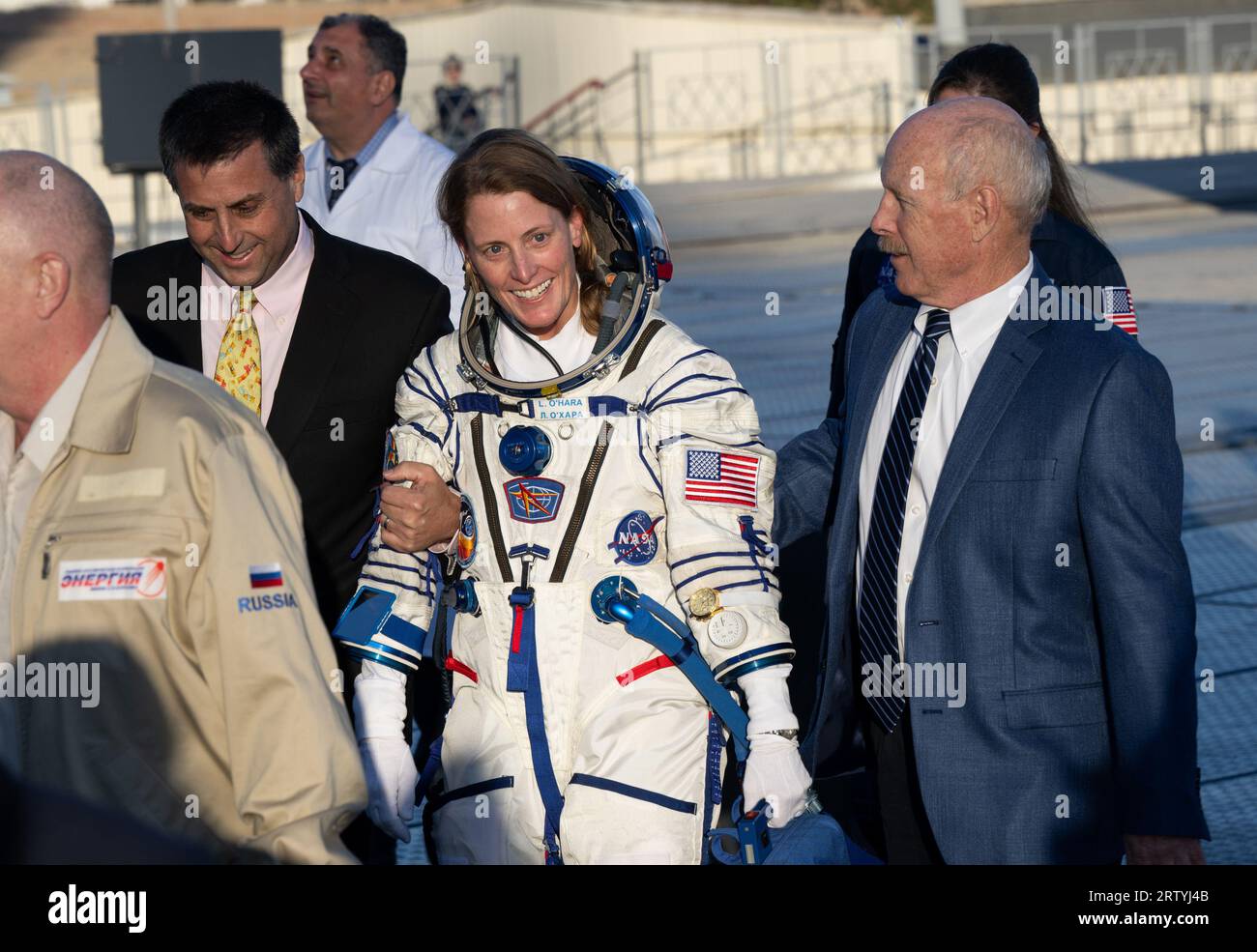 Expedition 70 crew member NASA astronaut Loral O'Hara walks with NASA International Space ...