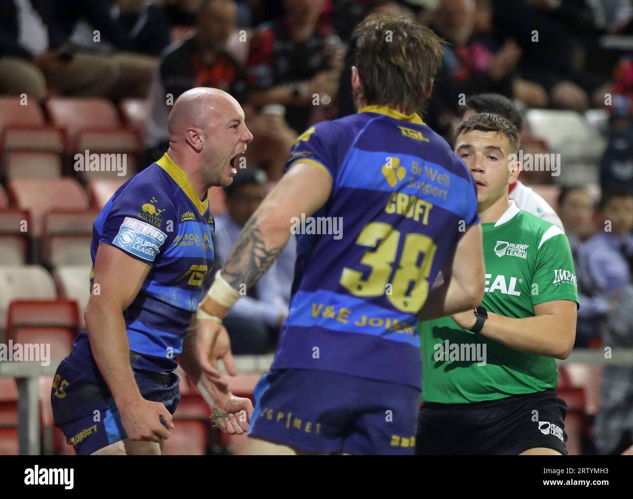 Wakefield's Lee Kershaw celebrates scoring his sides third try during ...