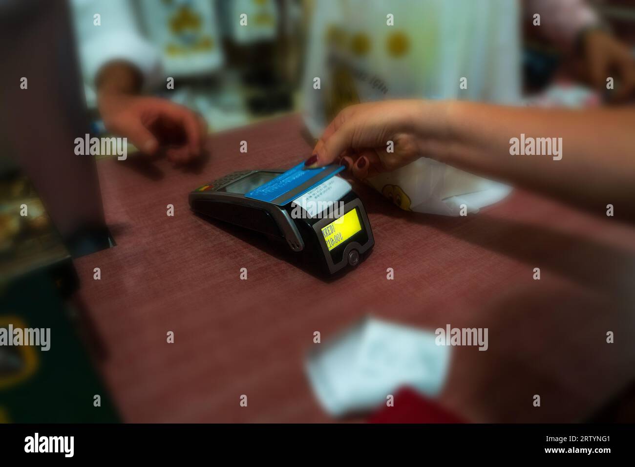 Contactless payment concept, Close up of hands of seller and buyer ...