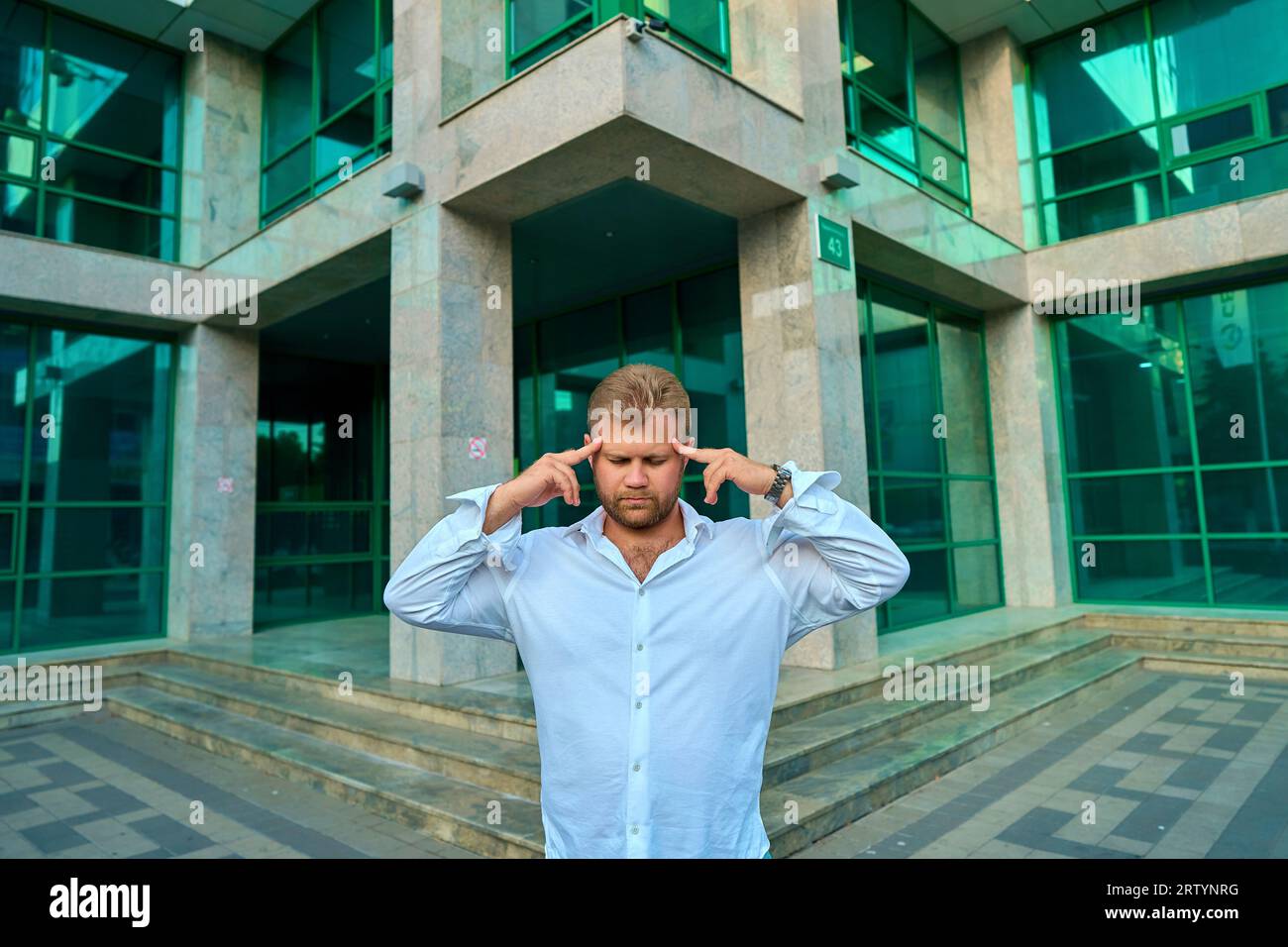 the man near the business center is disappointed Stock Photo - Alamy