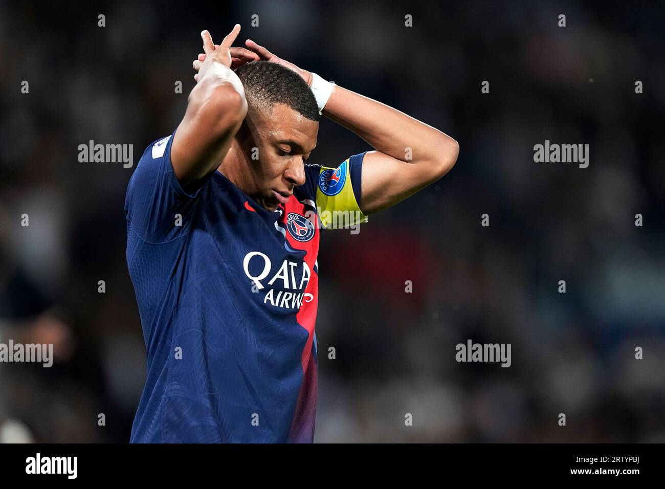 PSG's Kylian Mbappe reacts after missing a scoring chance during the ...