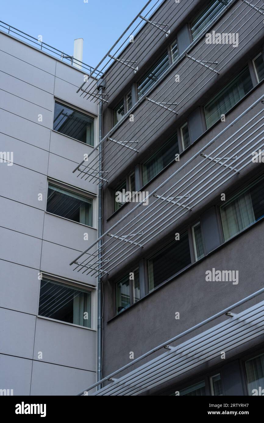 Corner of a grey office building Stock Photo - Alamy