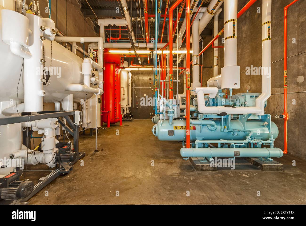 Compressor room in ammonia-cycle industrial refrigeration cold-storage ...