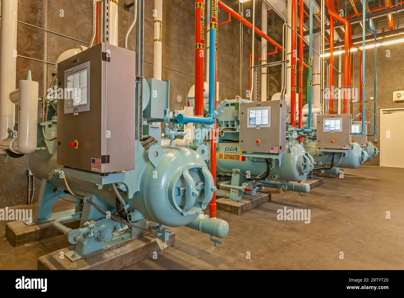 Compressor room in ammonia-cycle industrial refrigeration cold-storage ...