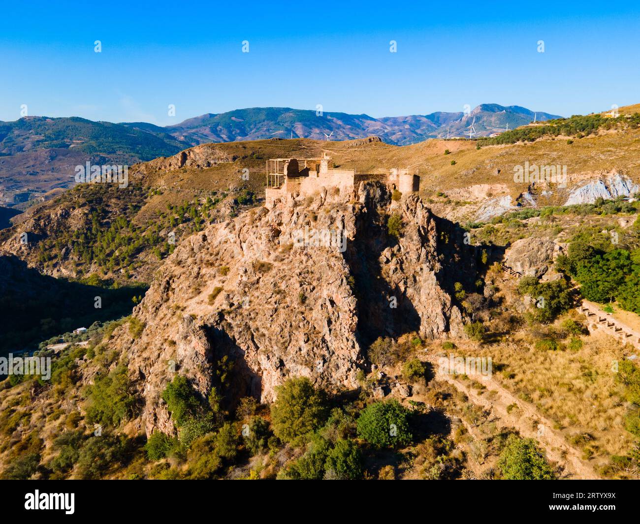 Lanjaron Castle or Castillo de los Moros aerial panoramic view, it is a ...