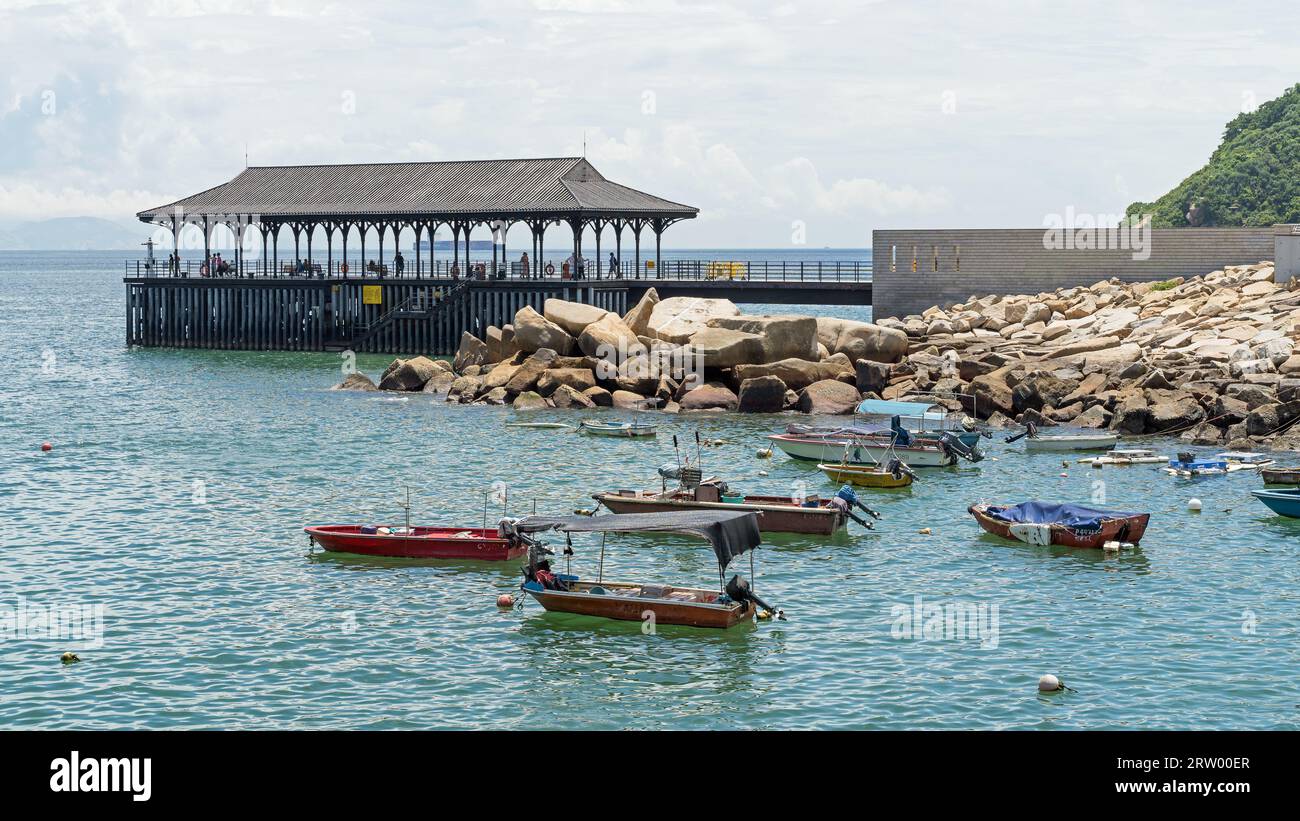 The rocky beach and shoreline of Stanley Bay in Hong Kong on a sunny ...