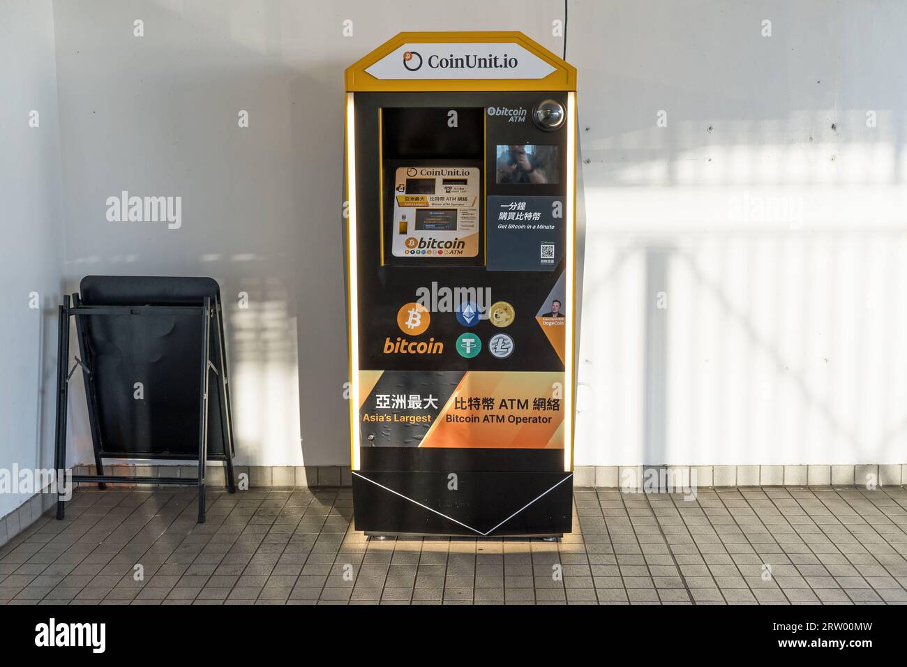 Bitcoin vending machine on the street on a sunny day. Hong Kong - 30th ...