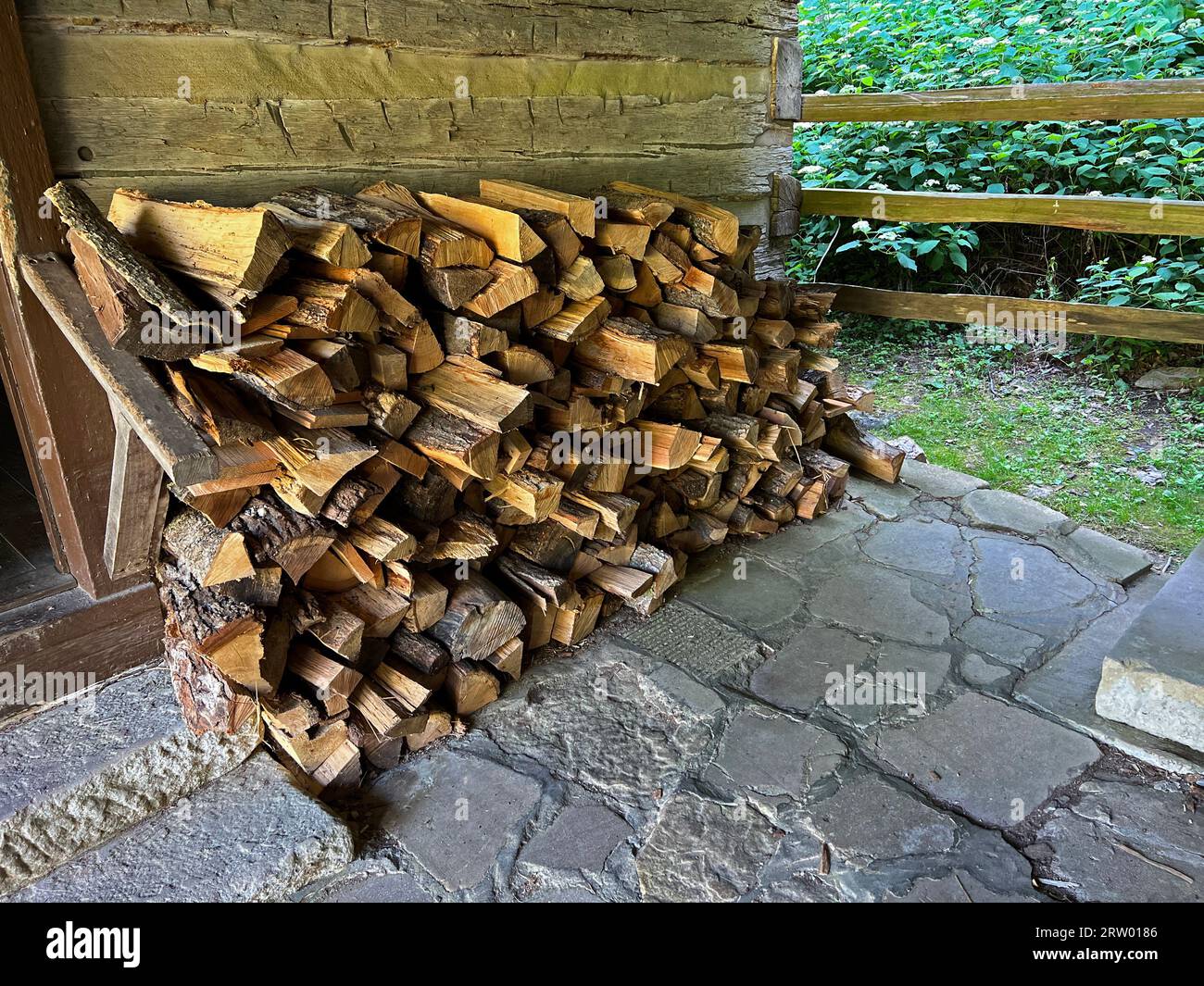 A Stack of Firewood Beside a House in Spring Mill State Park Stock ...