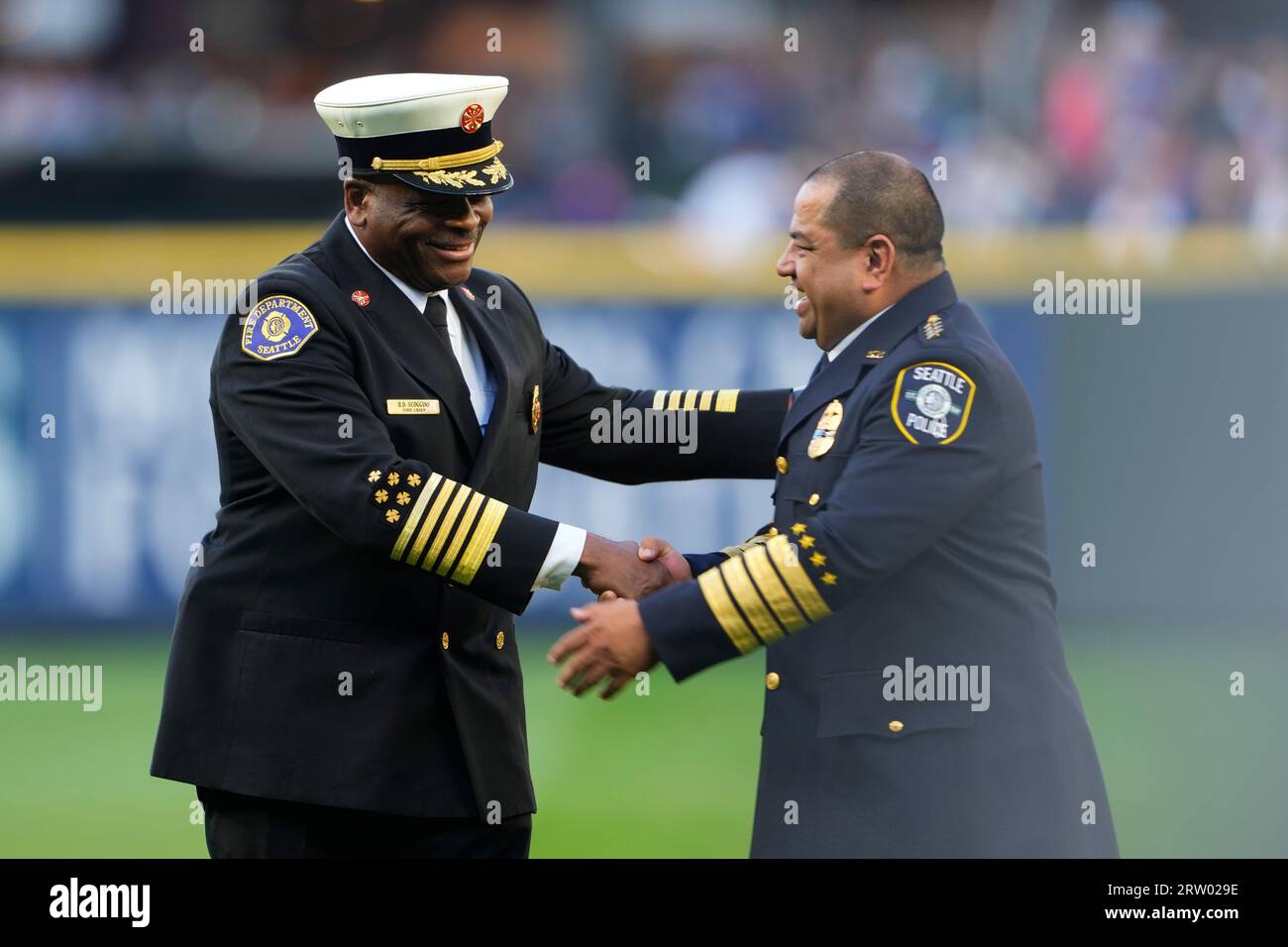 Seattle Fire Department Chief Harold Scoggins, left, and Seattle Police ...