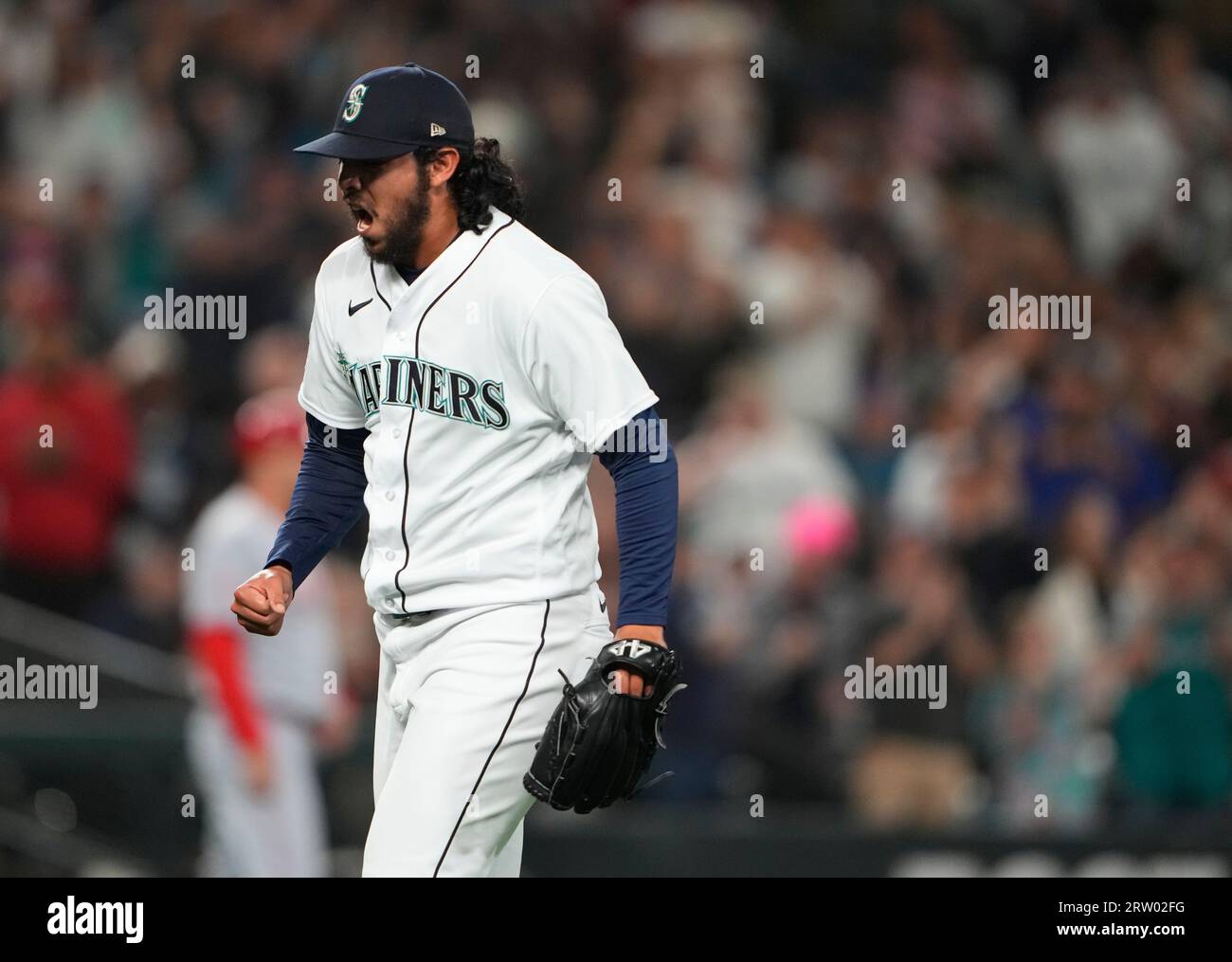 Seattle Mariners relief pitcher Andres Munoz reacts during a baseball ...
