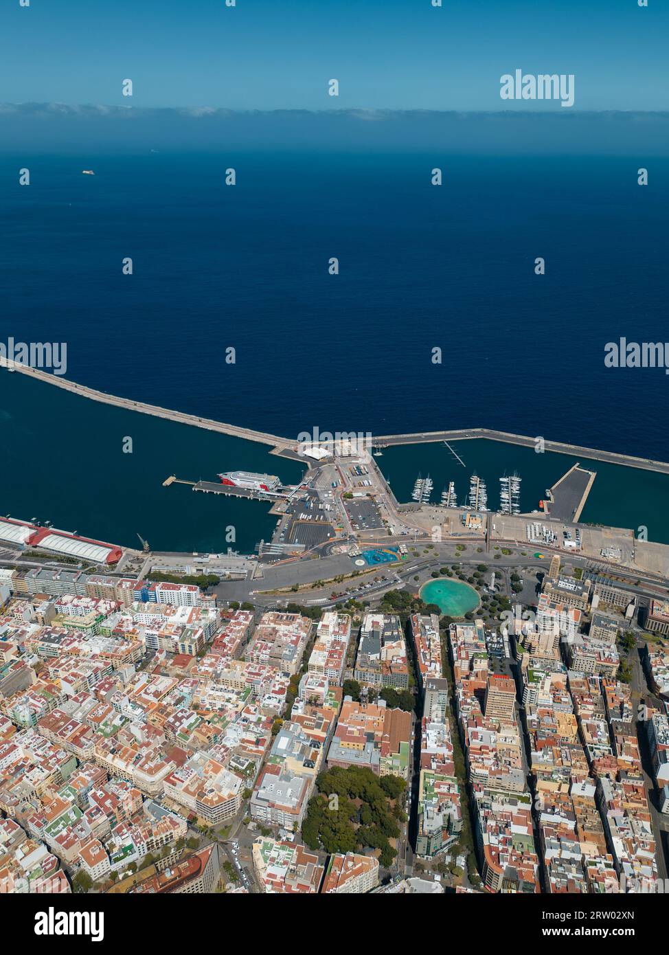 blue water of port, pier and harbor of Tenerife capital Santa Cruz ...