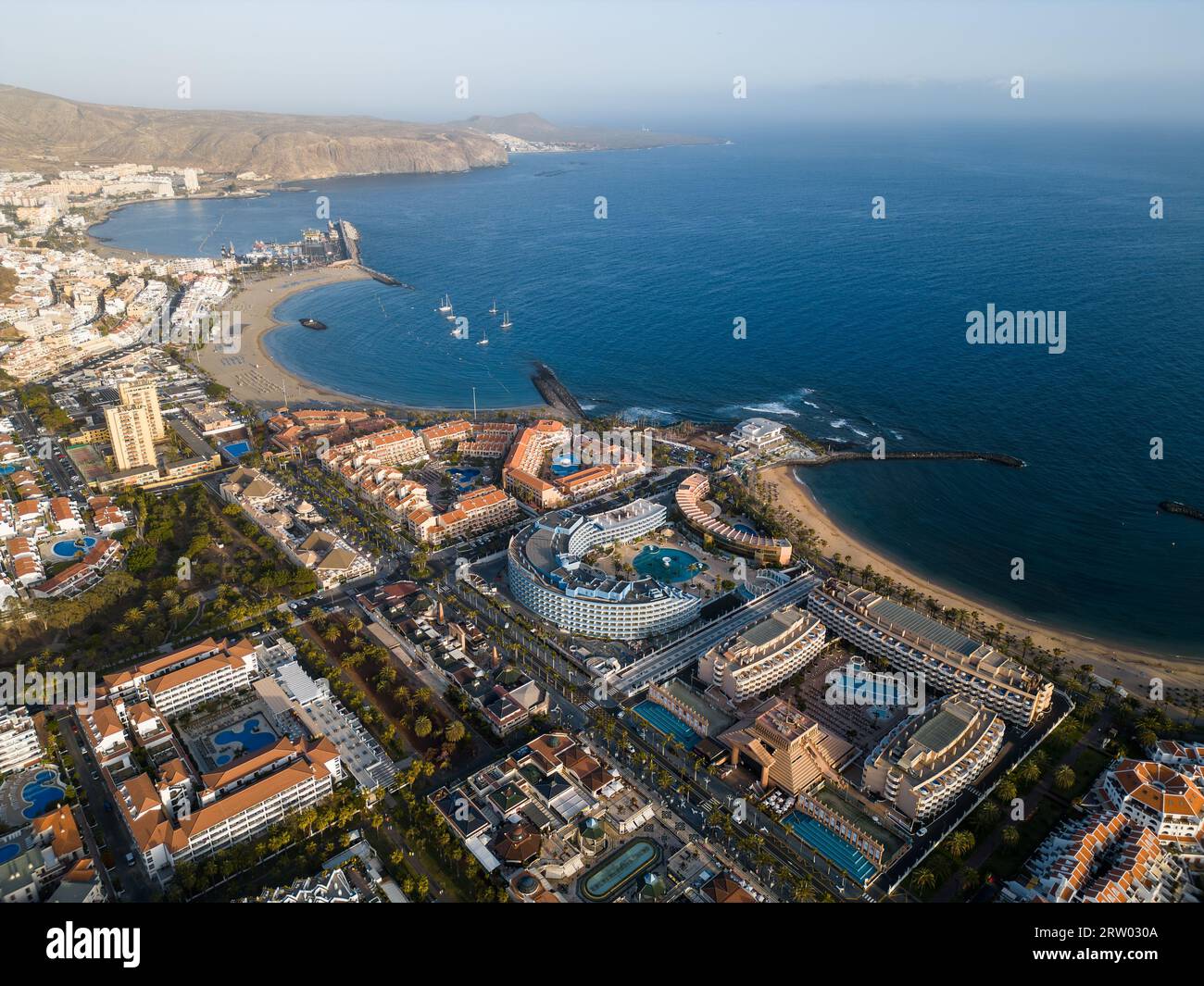 blue ocean water and luxury beach, hotels, resort of Tenerife, Canary ...