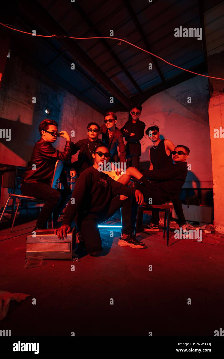 a group of delinquent teenagers wearing glasses and black clothes were ...