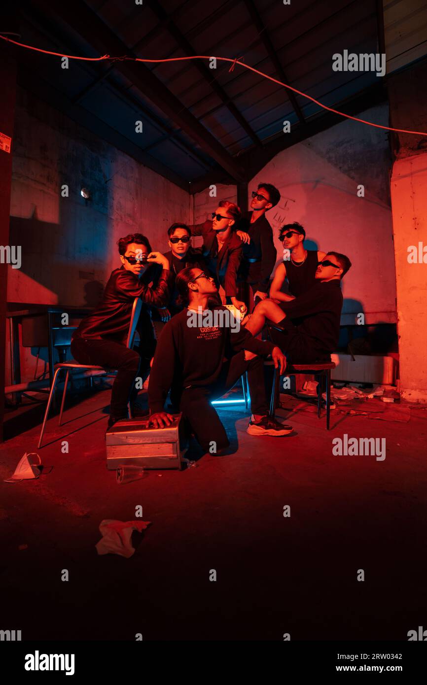 a group of delinquent teenagers wearing glasses and black clothes were ...