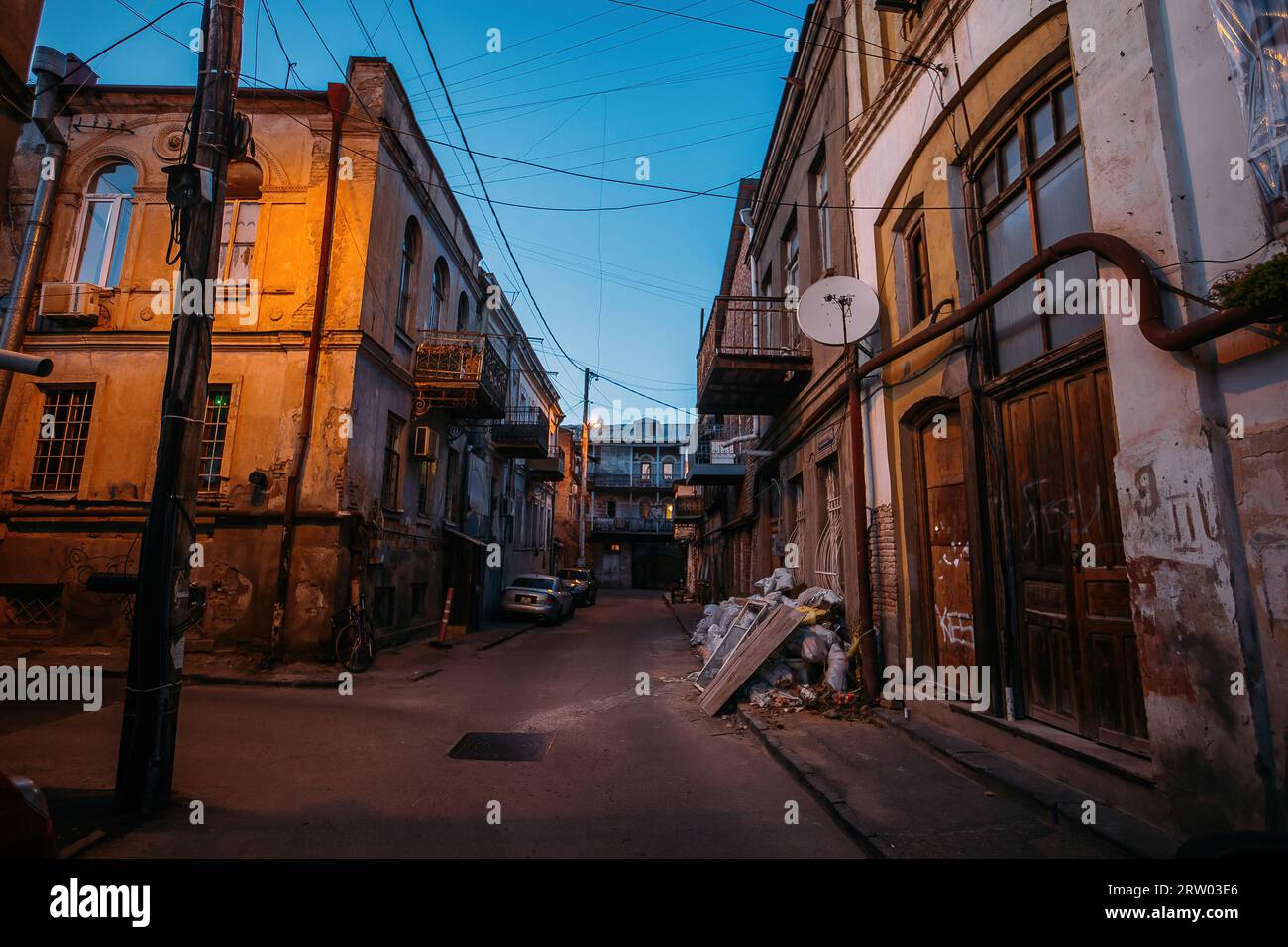 Old shabby houses in the slum district at Tbilisi at night Stock Photo ...