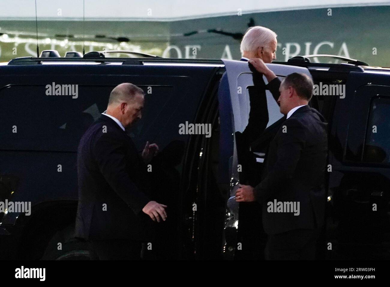 President Joe Biden gets into his motorcade after arriving at Delaware ...