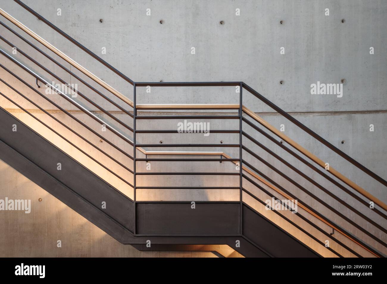 Interior front elevation view at the black steel staircase and ...