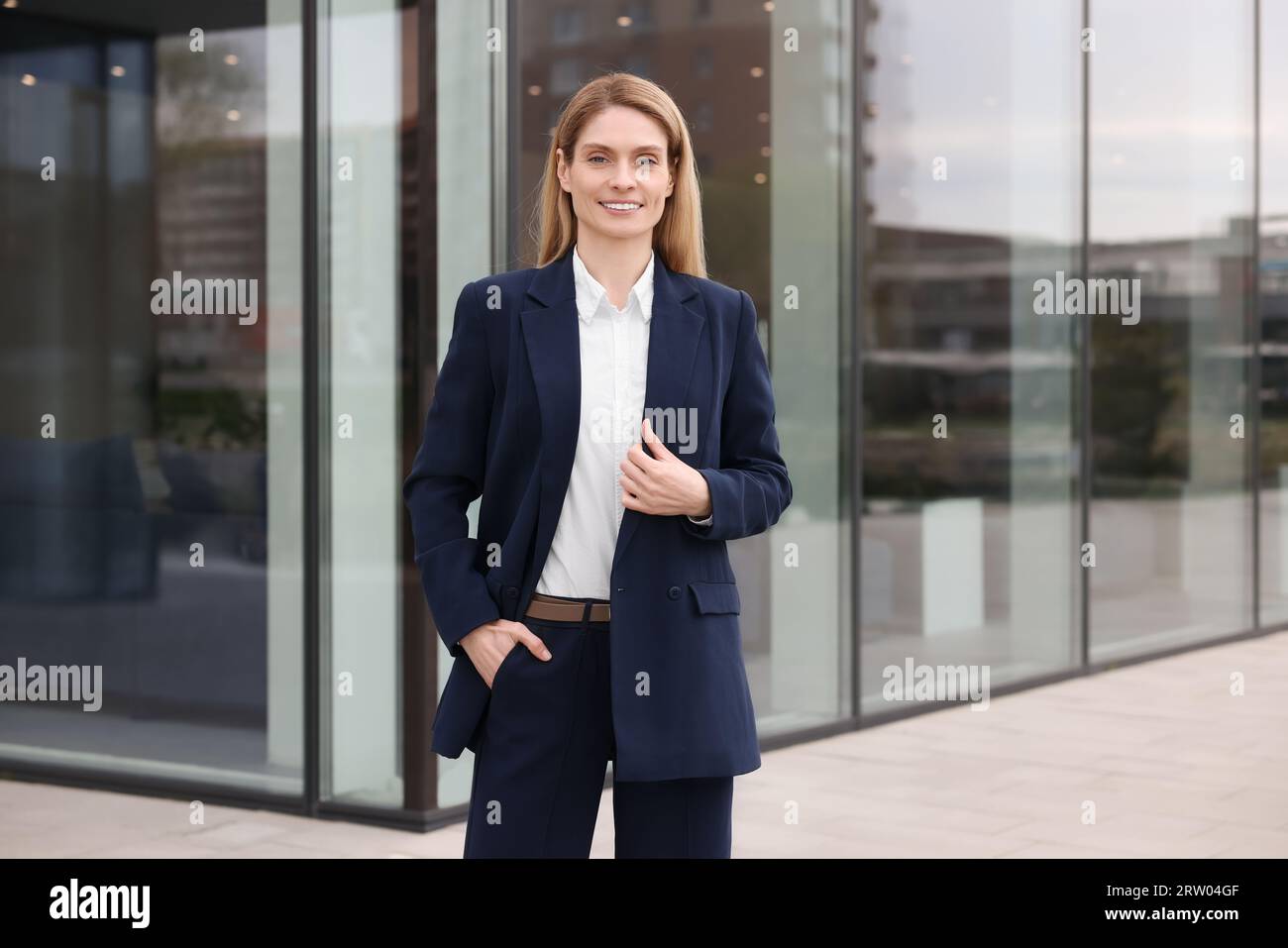 Happy real estate agent in hi-res stock photography and images - Alamy