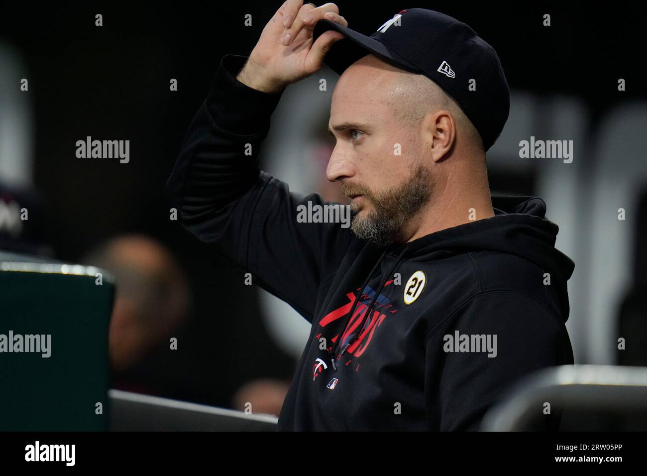 Minnesota Twins manager Rocco Baldelli sits in the dugout during the ...