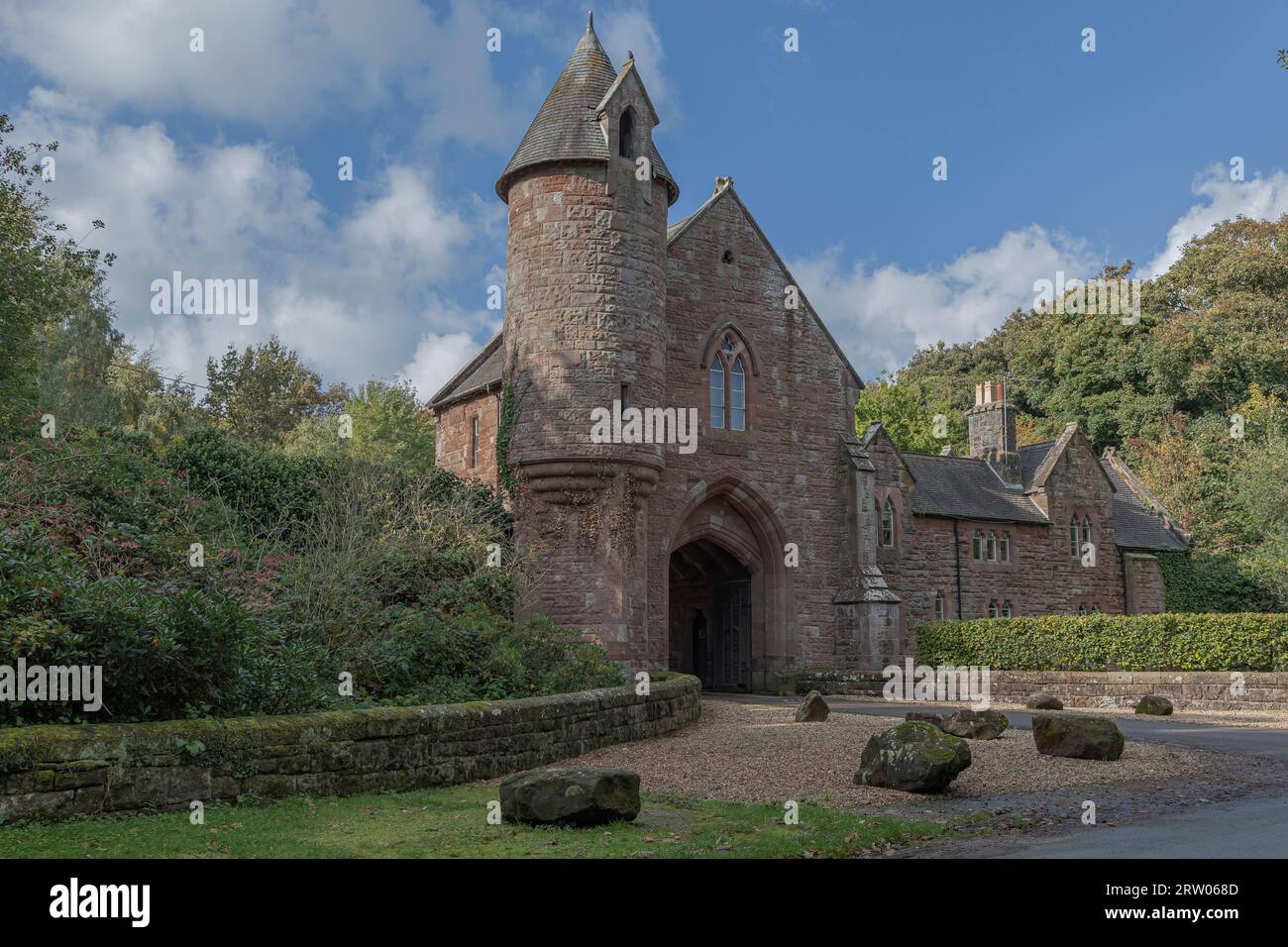 Entrance to a castle with round towerand pointed tiled roof Stock Photo ...