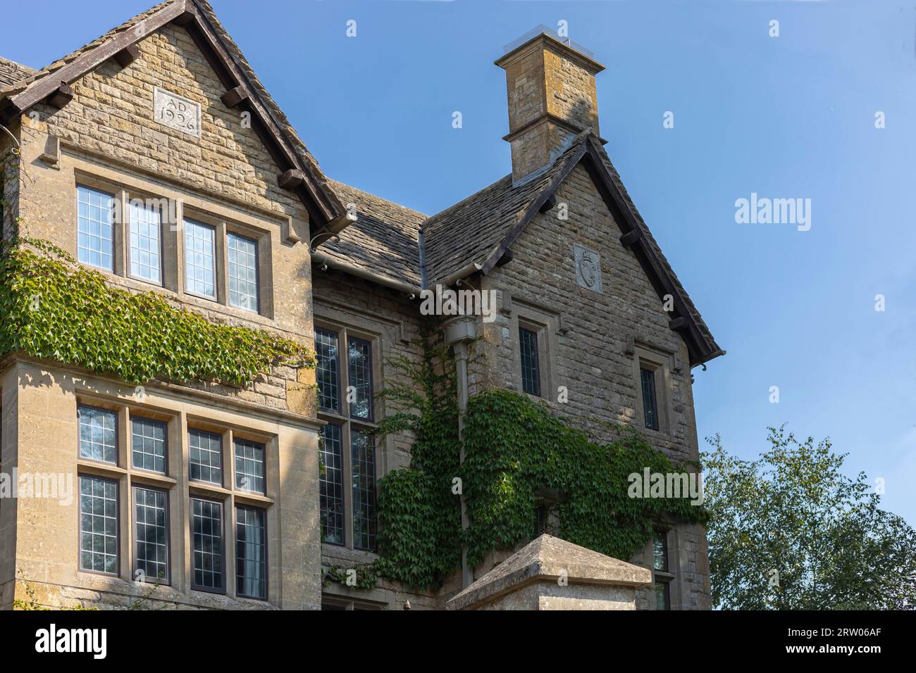 Nineteenth century pale stone house built of honey coloured stone with ...