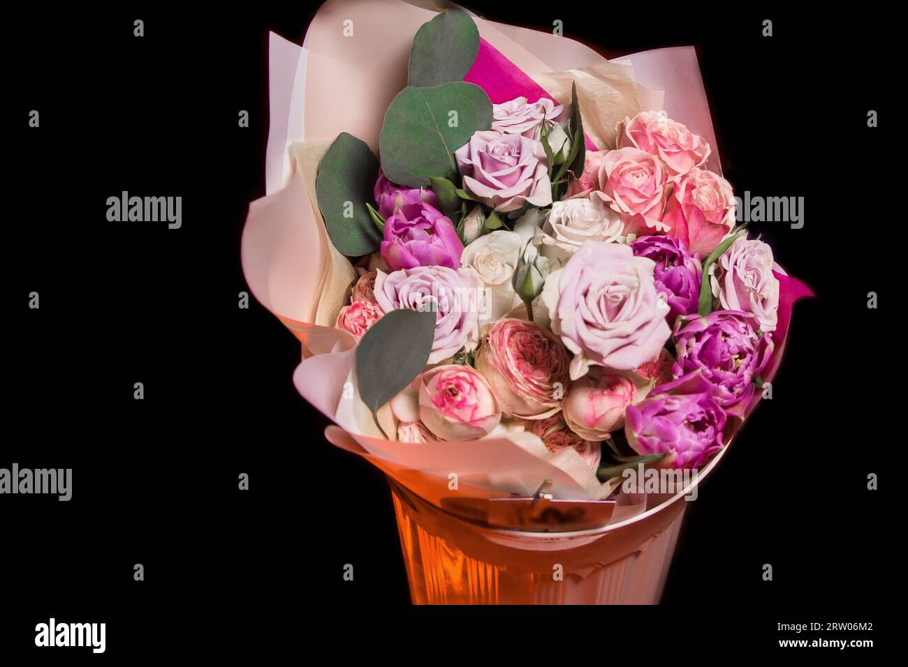 Bouquet of fresh flowers of different colors of roses in paper ...