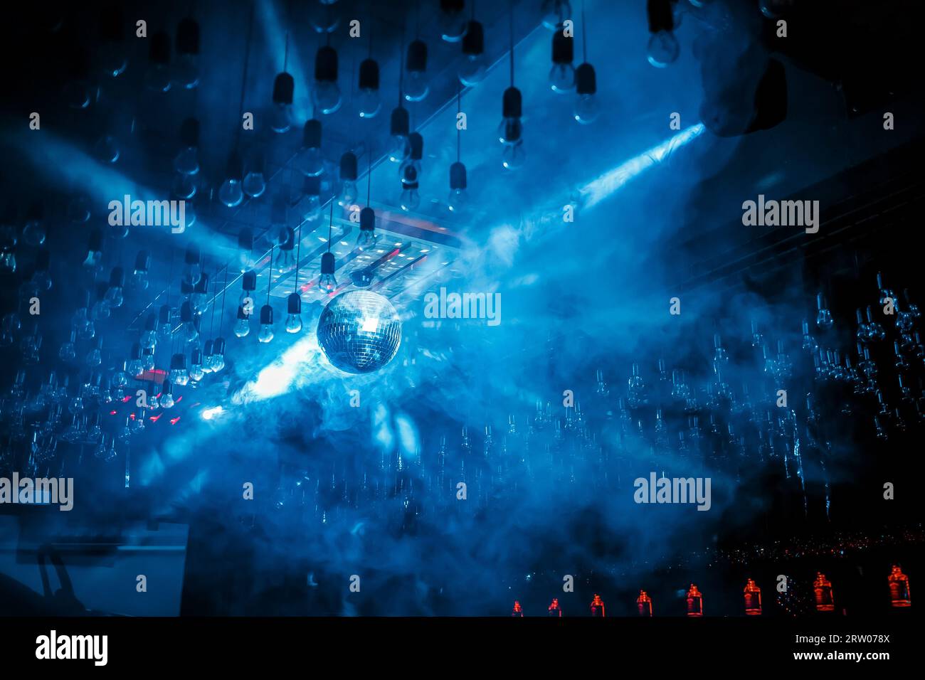 The atmosphere of a nightclub nightlife, a disco, a brilliant glare, a ...