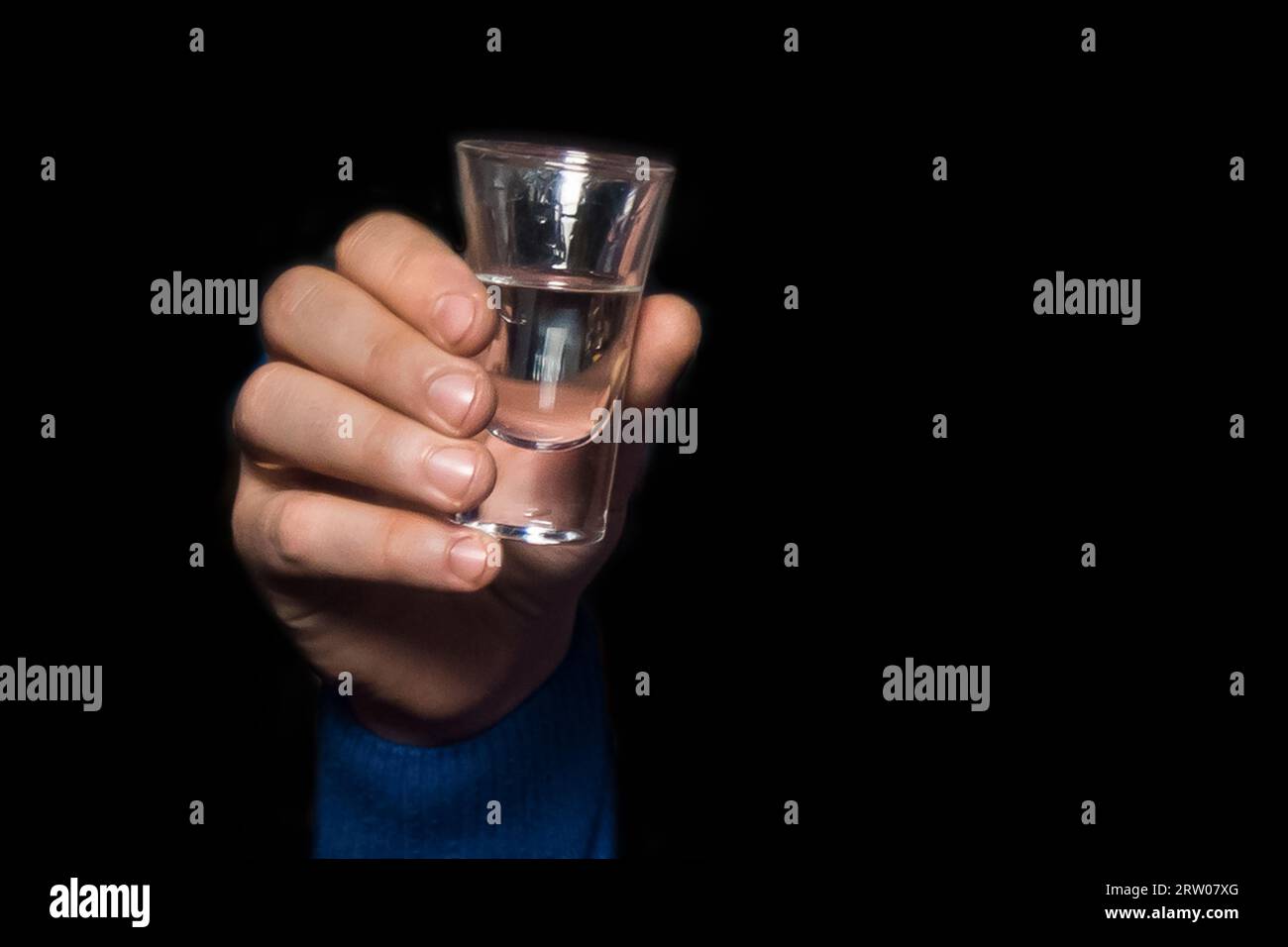 Vodka glass hand hi-res stock photography and images - Alamy