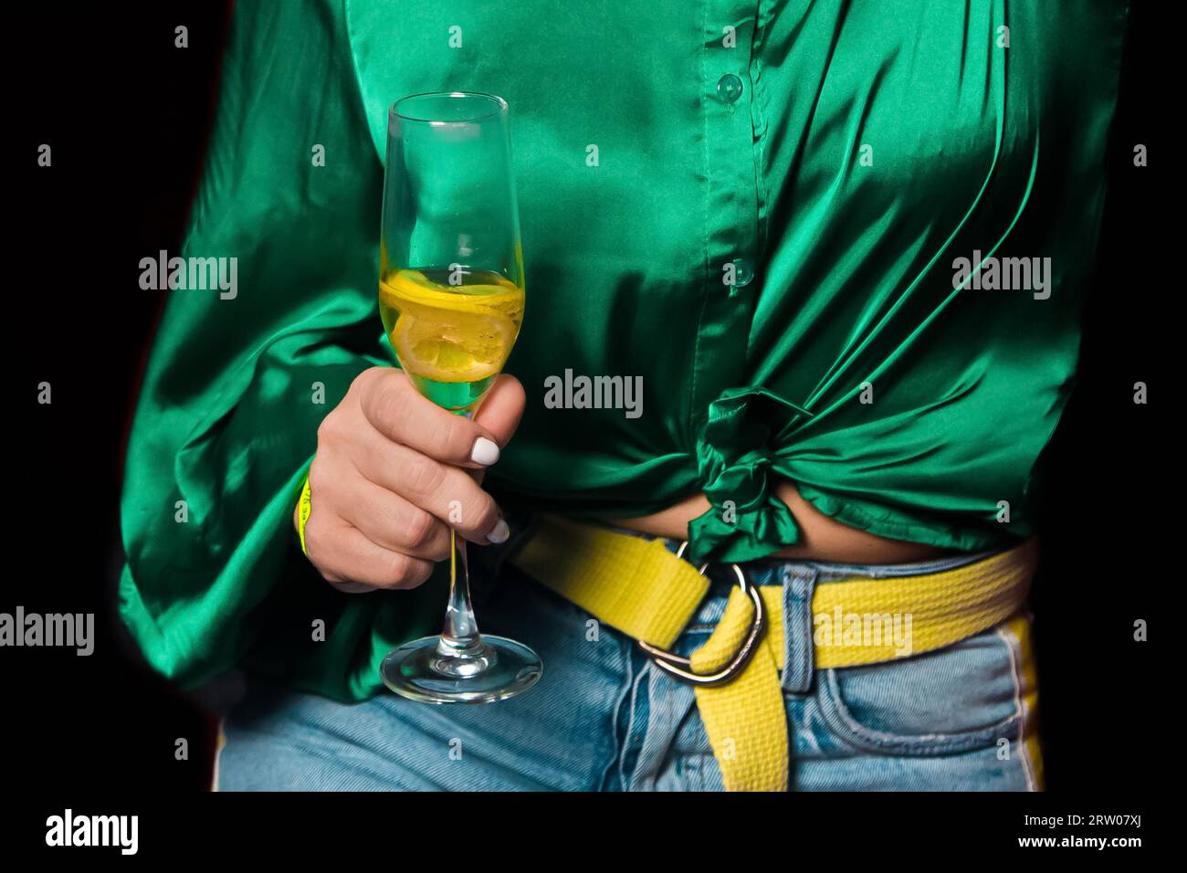 Women's fashion and green clothing style with yellow belt and blue ...