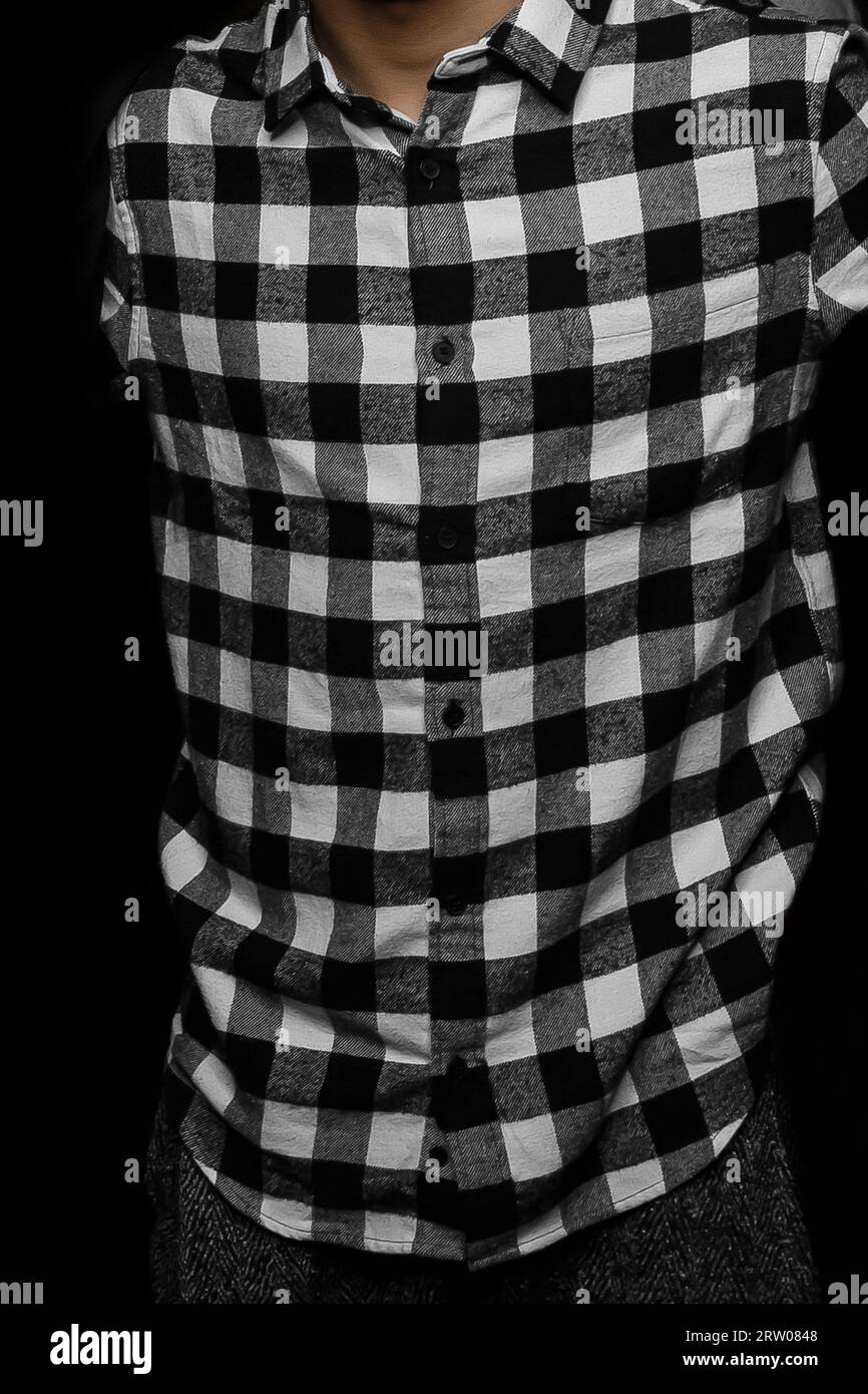 Black and white checkered shirt hi-res stock photography and images - Alamy