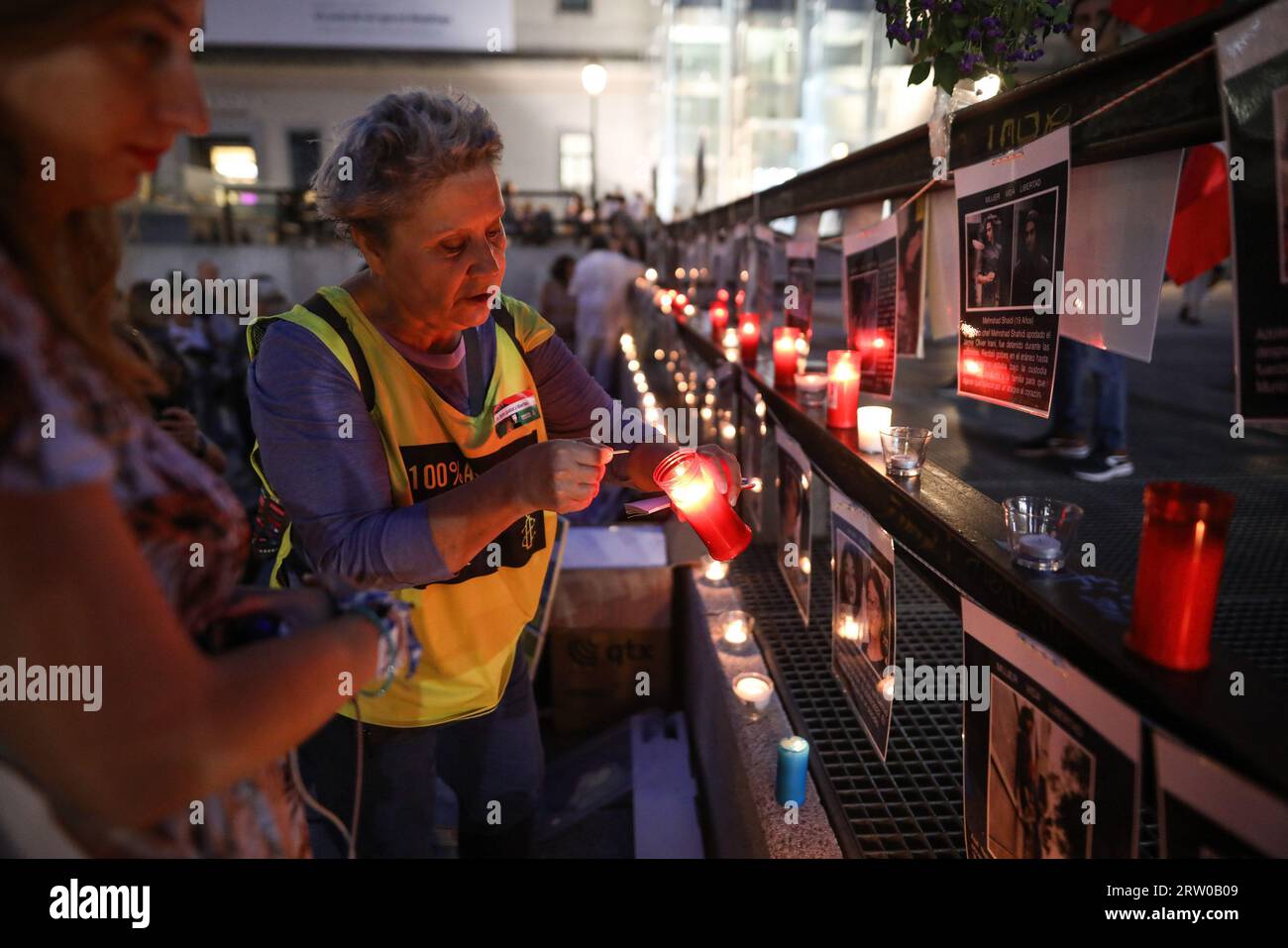 Madrid, Spain. 15th Sep, 2023. An activist lights candles to mark the ...