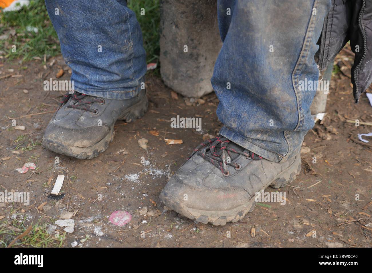 a poor men wearing a dirty shoe at street Stock Photo - Alamy
