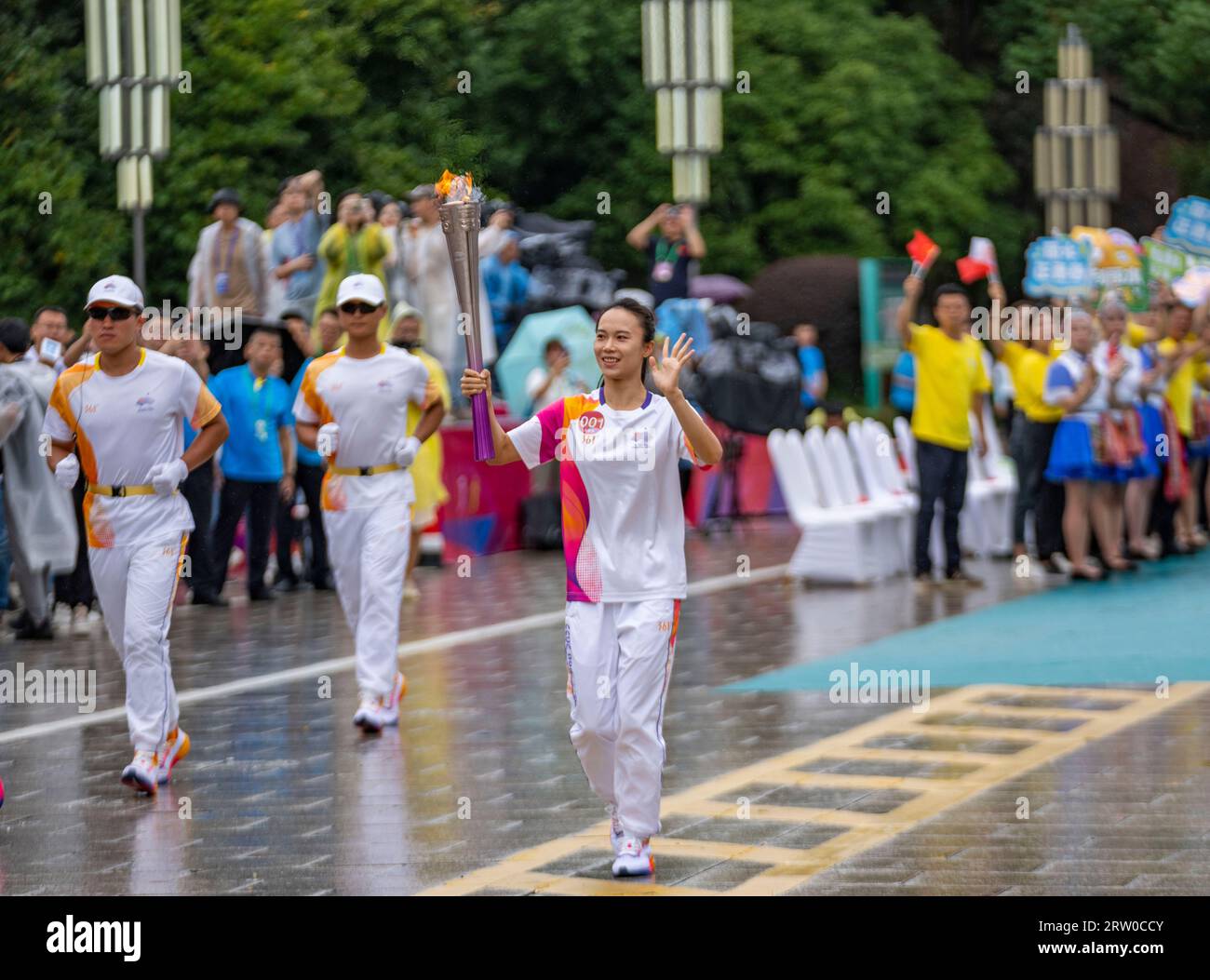 Lishui, China's Zhejiang Province. 16th Sep, 2023. Torch bearer Fang Yuting runs with the torch ...
