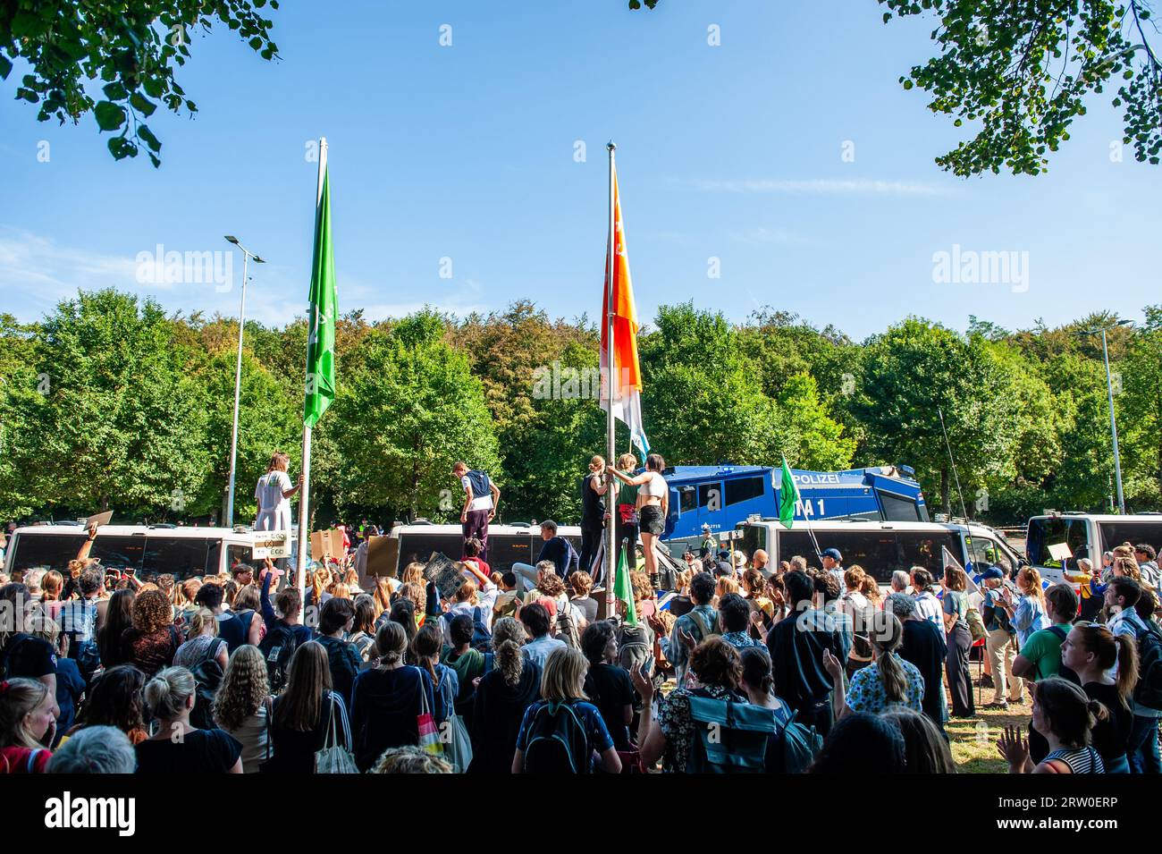 Hundreds of people are seen watching and supporting the blockade from ...