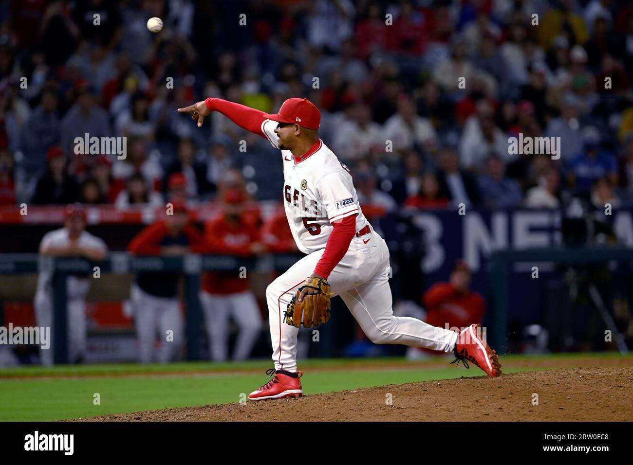 Los Angeles Angels' Eduardo Escobar, normally an infielder, pitches to ...