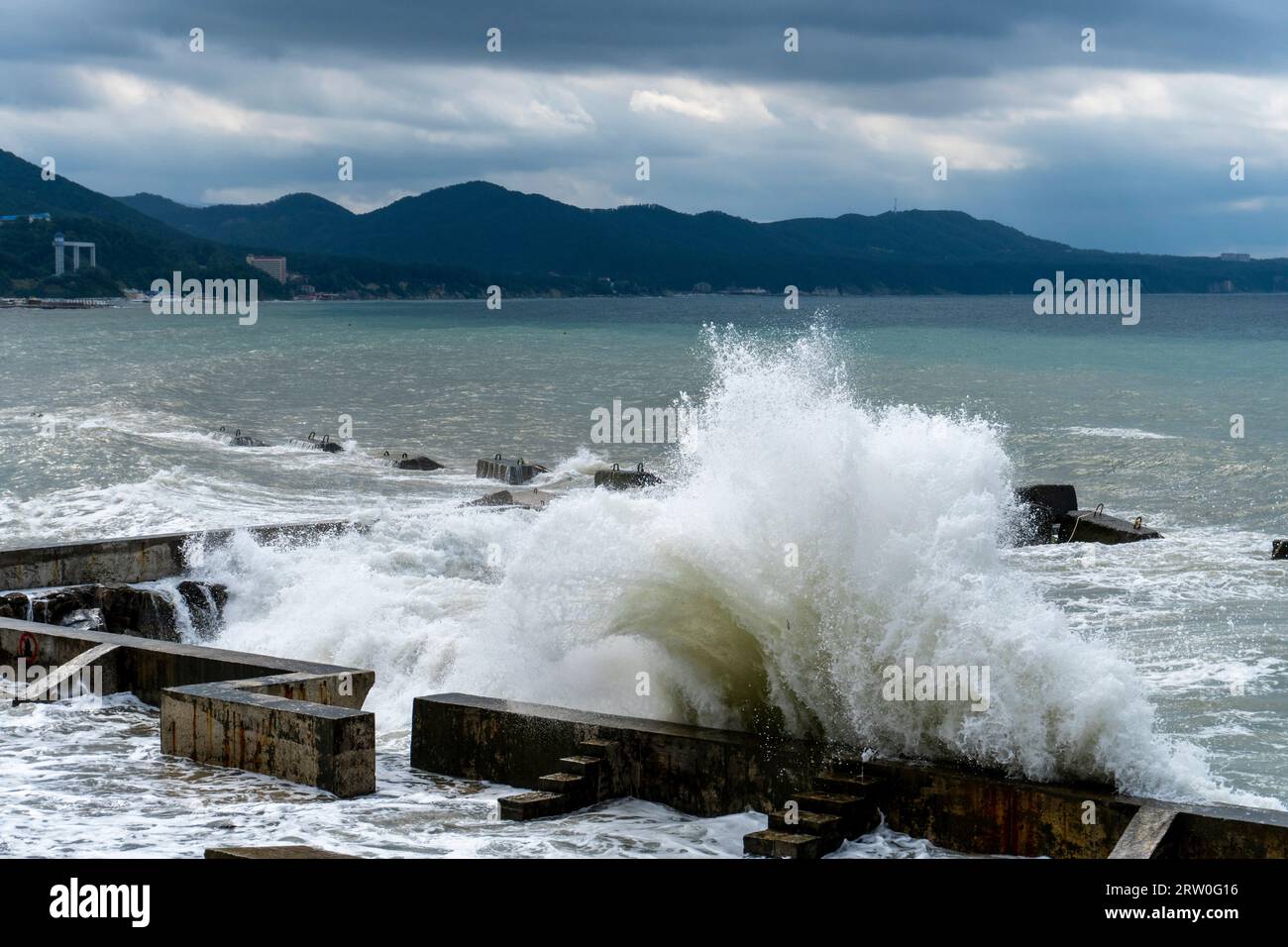 small storm on the sea, waves hitting the shore Stock Photo - Alamy
