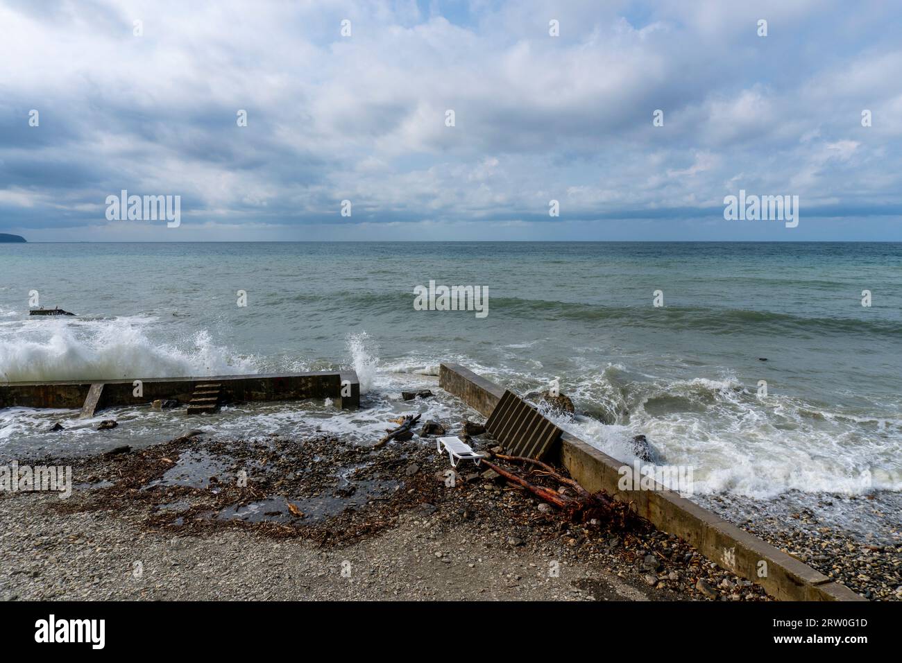 small storm on the sea, waves hitting the shore Stock Photo - Alamy