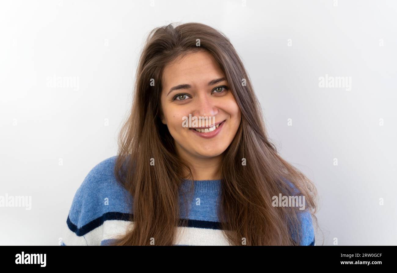 Portrait of a young beautiful woman smiling, coquette Stock Photo - Alamy