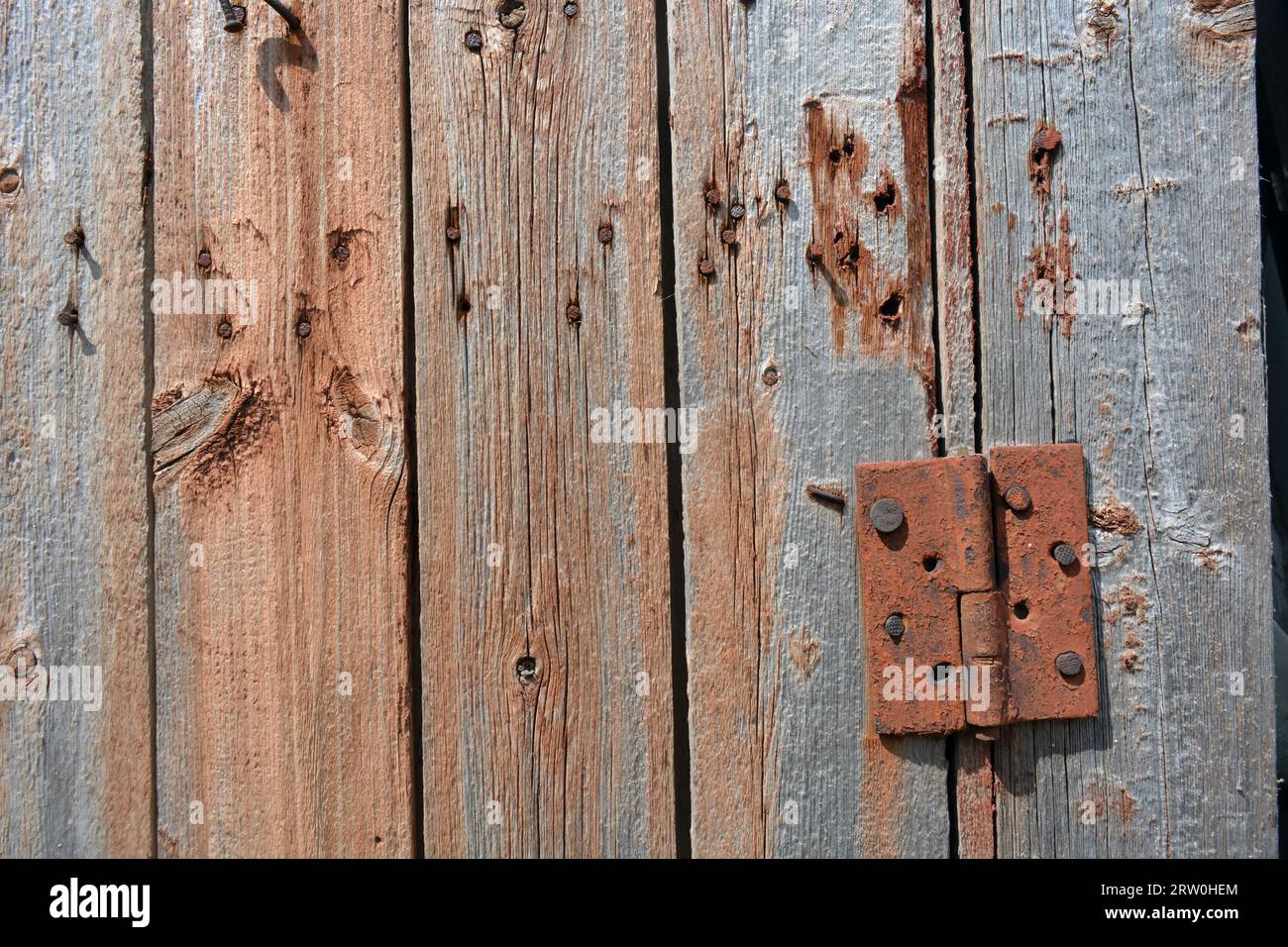 Wooden boards with old peeling paint with an interesting textured ...