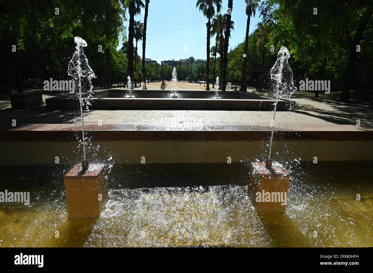 Multiple water fountains at a park in Spain Stock Photo - Alamy