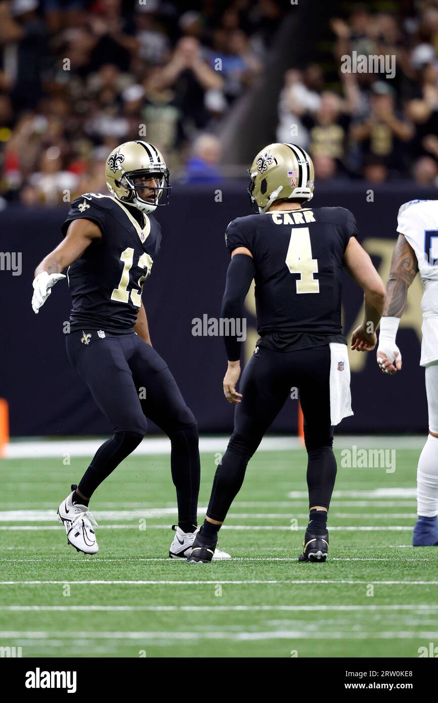 New Orleans Saints wide receiver Michael Thomas (13) and quarterback ...