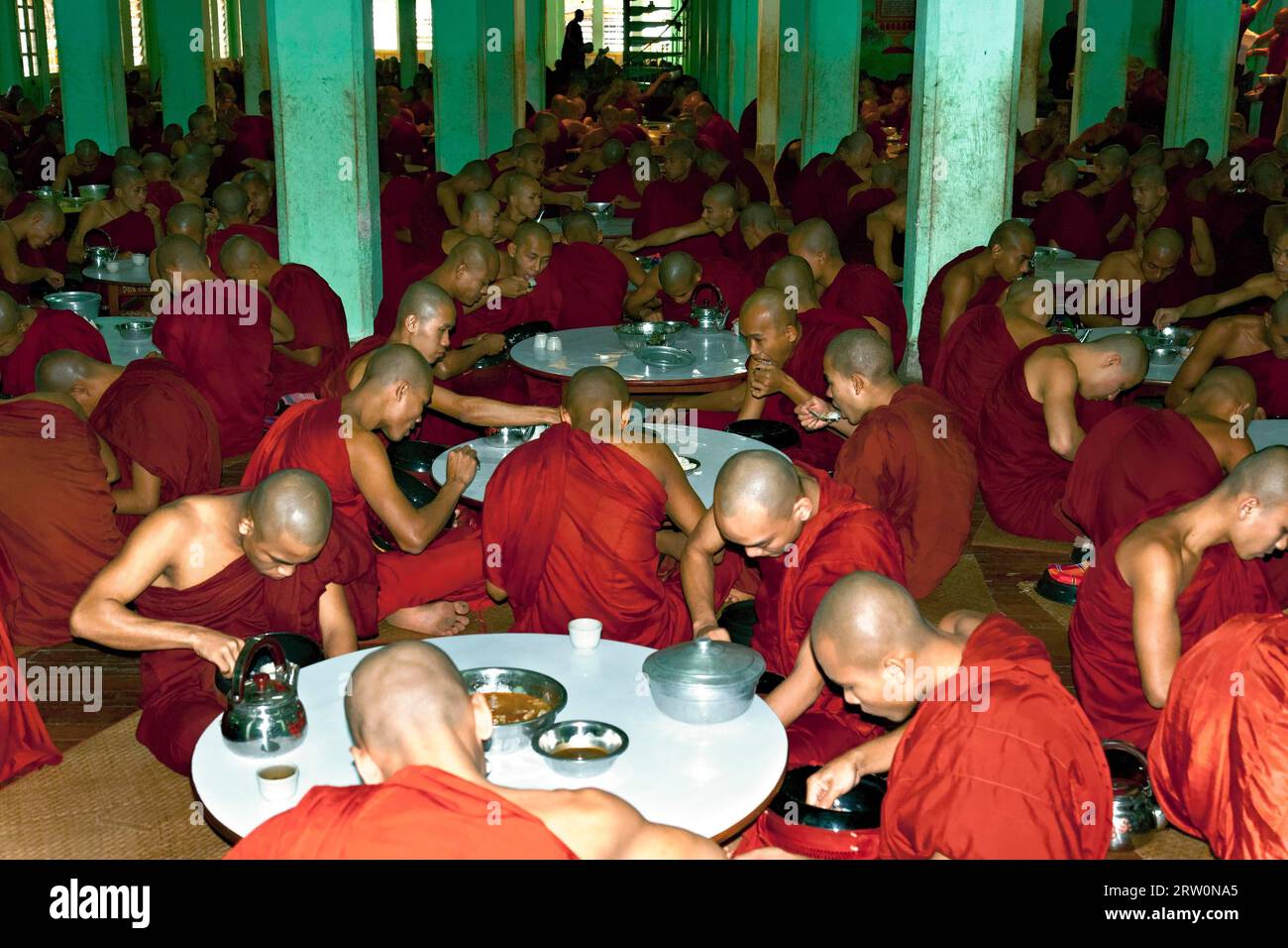 Monks having lunch at Bago Monastery School, Myanmar Stock Photo - Alamy