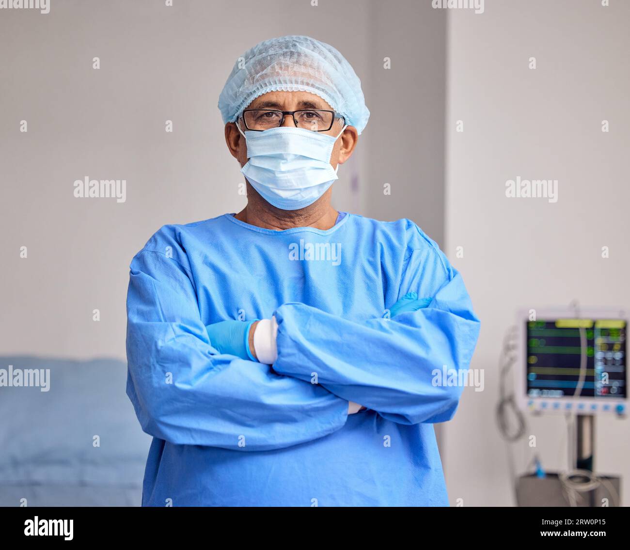Surgeon, portrait and man with arms crossed in hospital with confidence ...