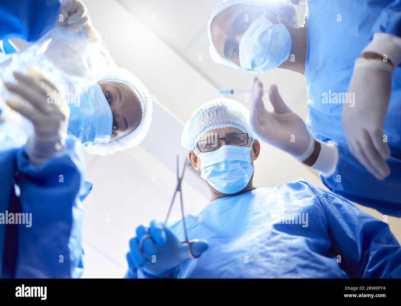 Hospital, tools and surgeon team in theatre for emergency, healthcare ...